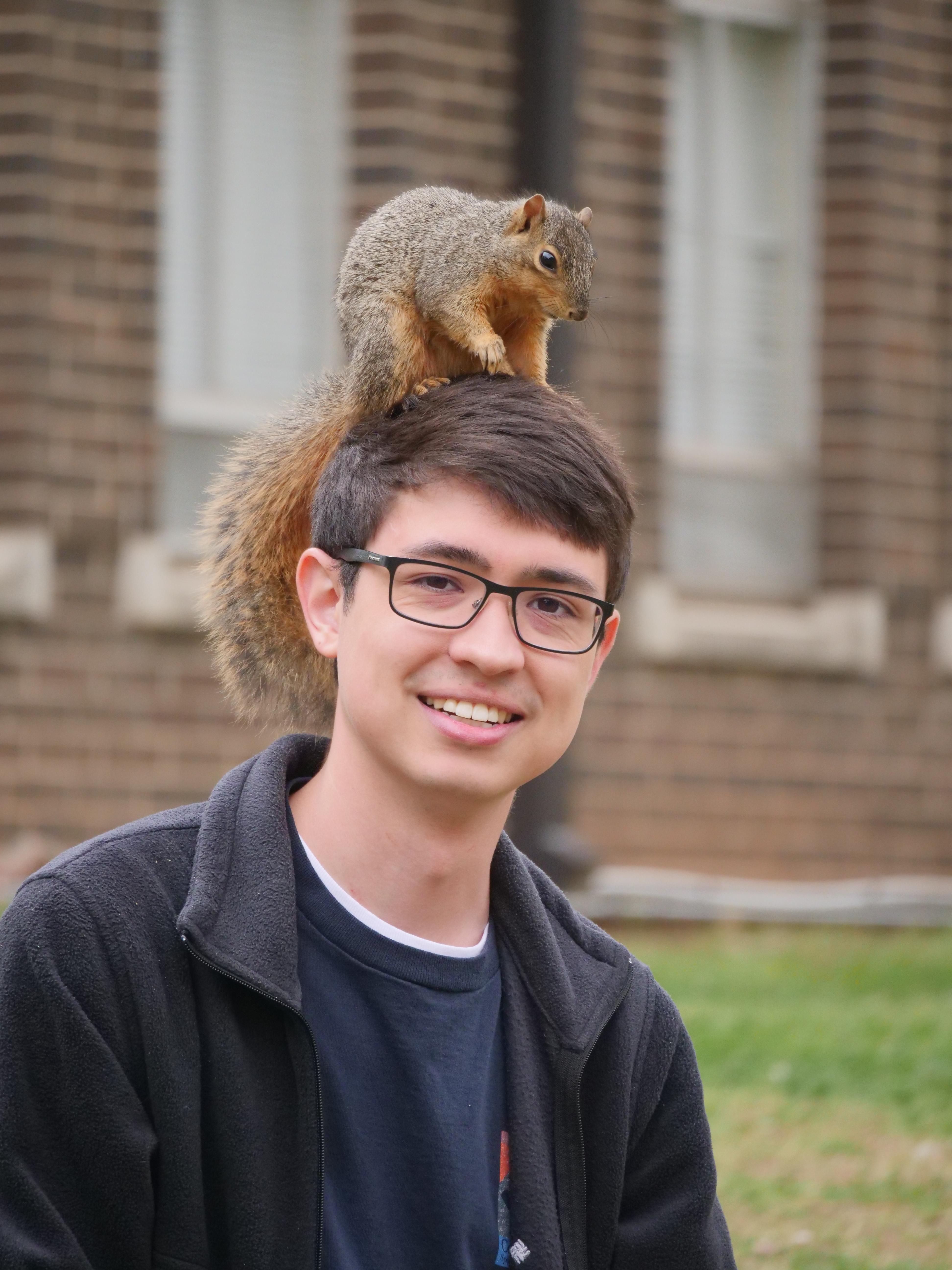 Local squirrel on my friend's head | Scrolller