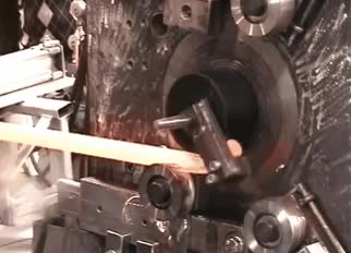 [Machine] Forging a steel spring (). | Scrolller
