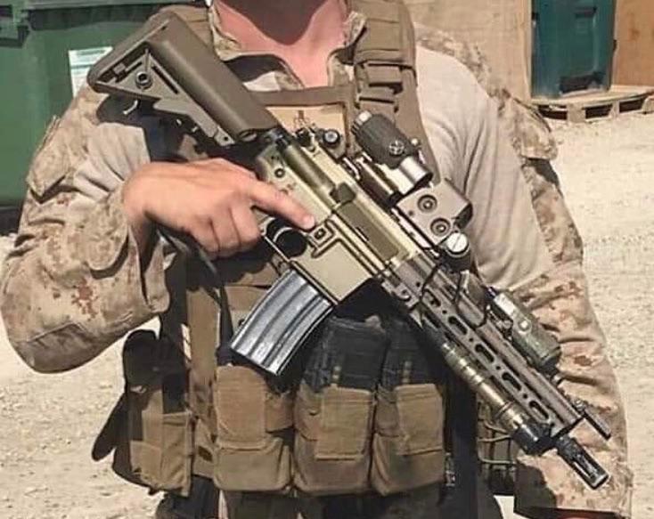 Marine posing with CAG rifle | Scrolller
