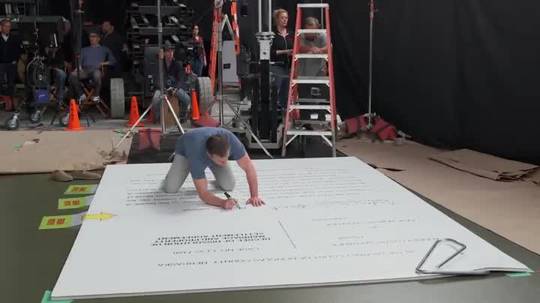 Matt Damon signing his divorce papers in the movie "Downsizing" | Scrolller