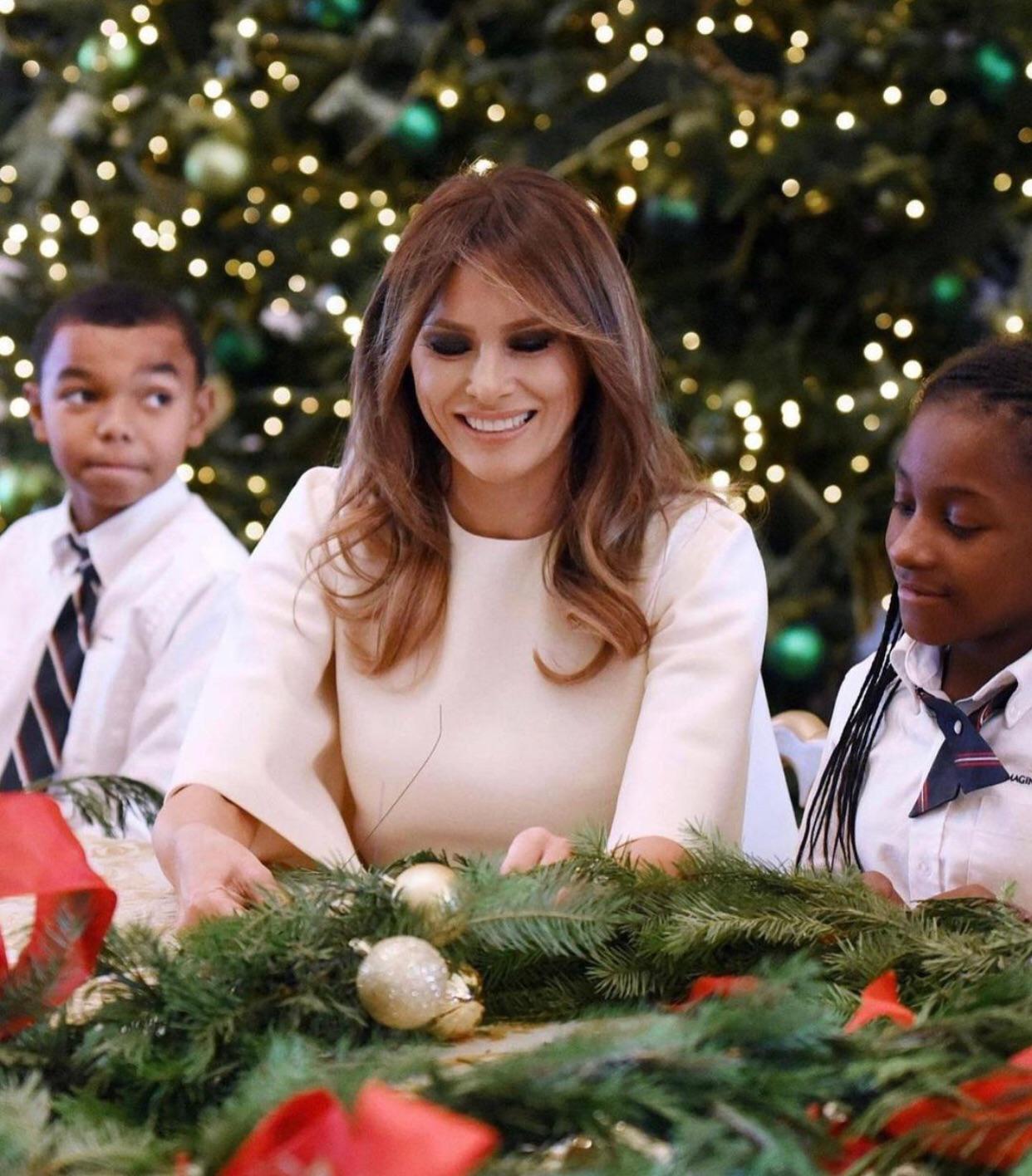 Melania Trump with her children from her affair with a number of her black security team | Scrolller