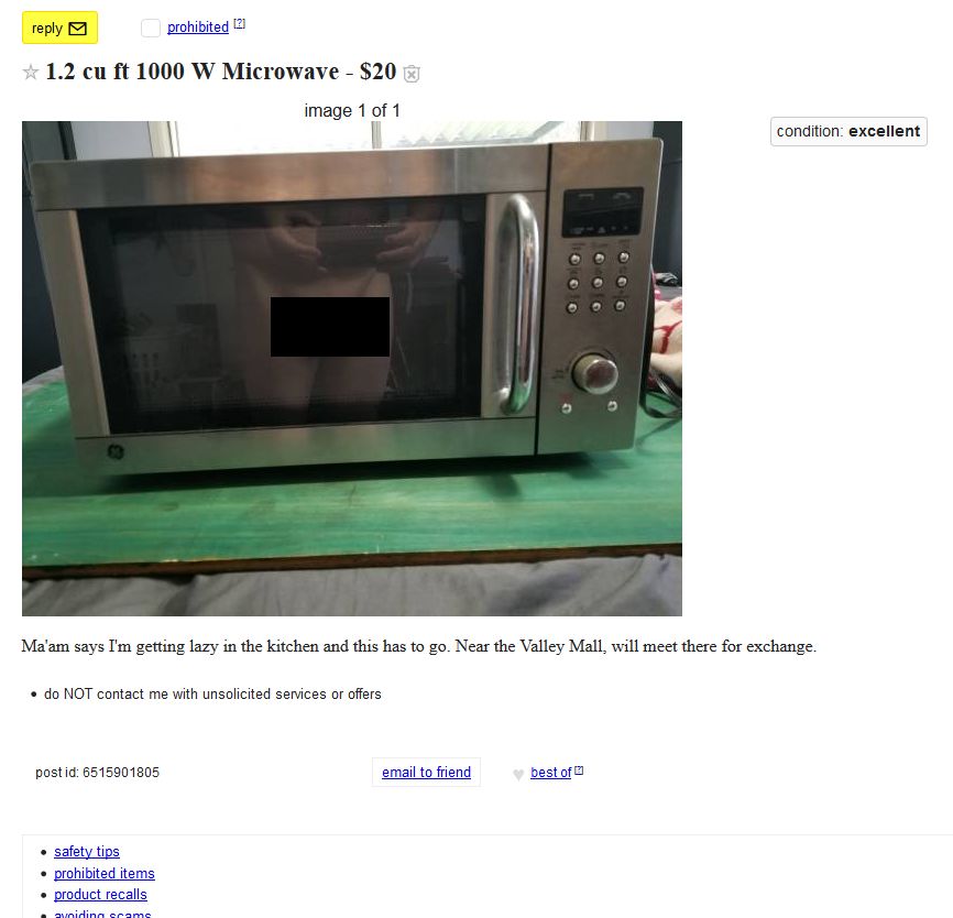 Microwave with an unfortunate reflection in Spokane. | Scrolller