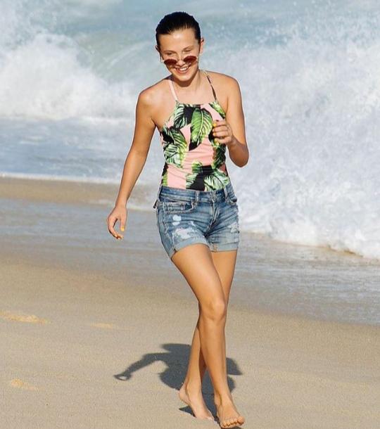 Millie at the beach | Scrolller