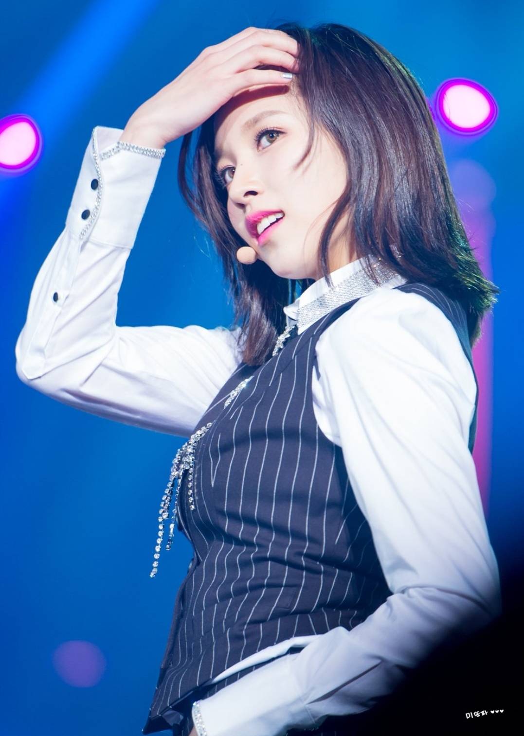 Mina - light eyes, white shirt, black striped vest | Scrolller