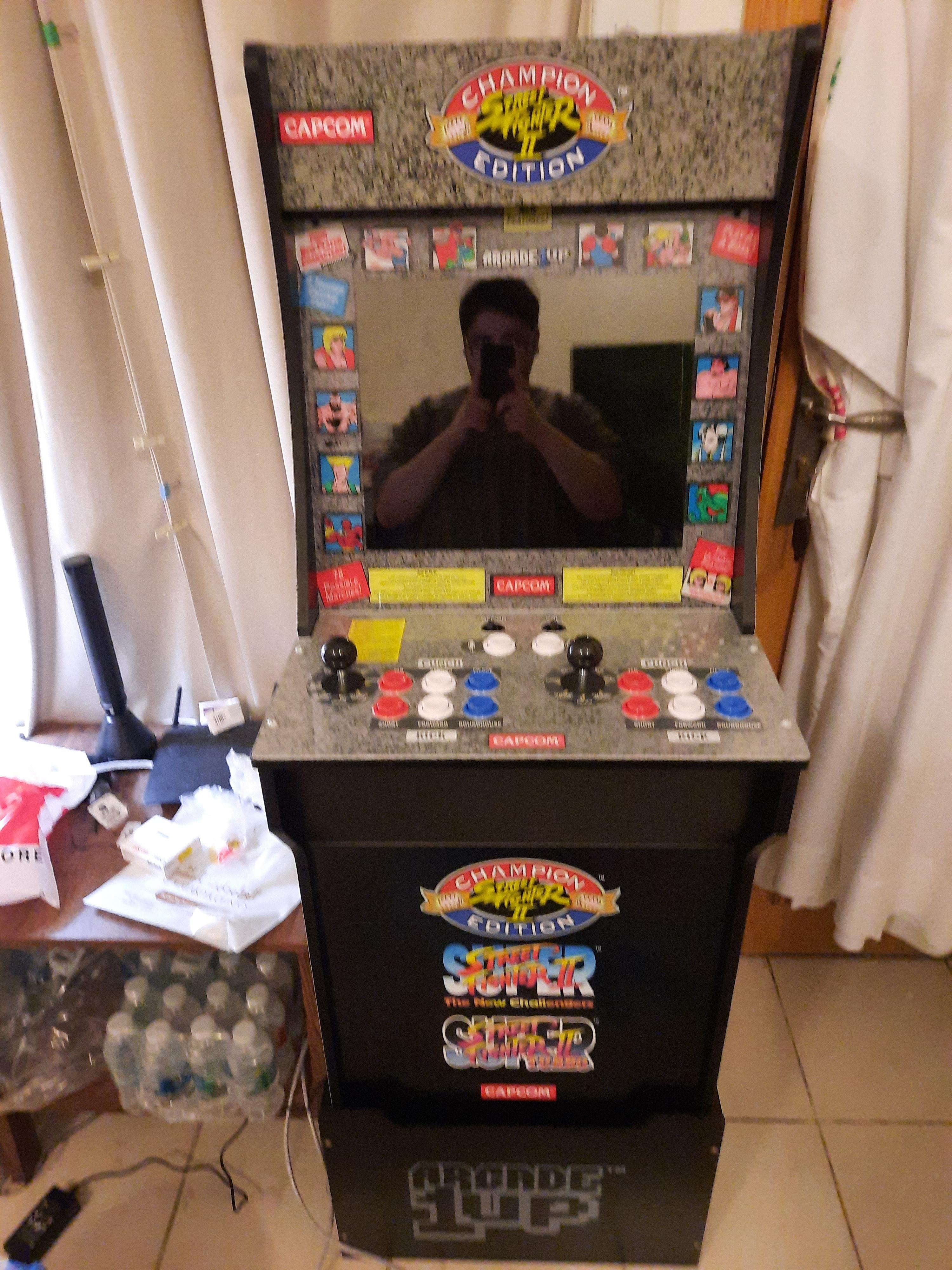 My first Arcade 1up cabinet and it's street fighter edition also it came with the riser and it's ...