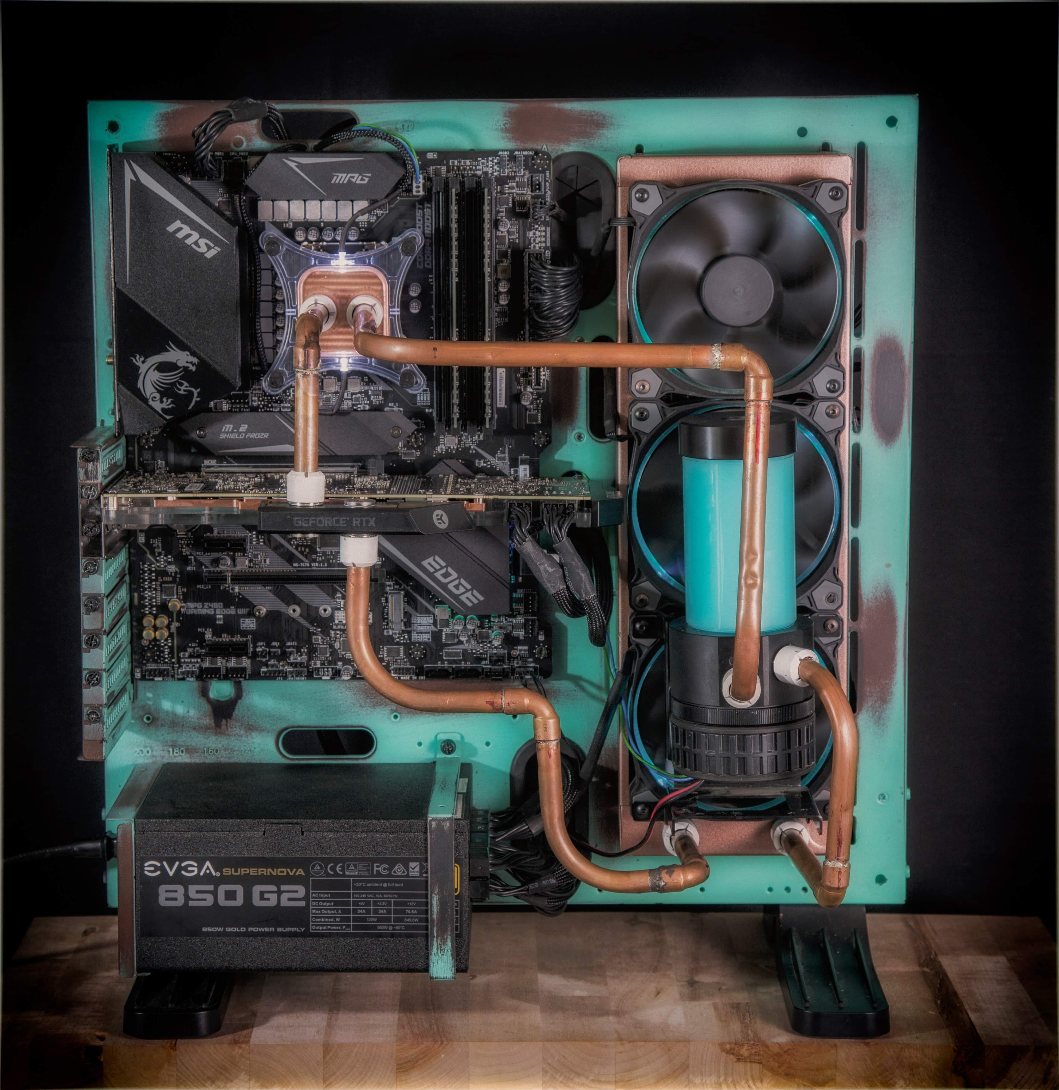 My first truly custom build/custom loop. Yes I know the copper job looks bad, it was intentional ...