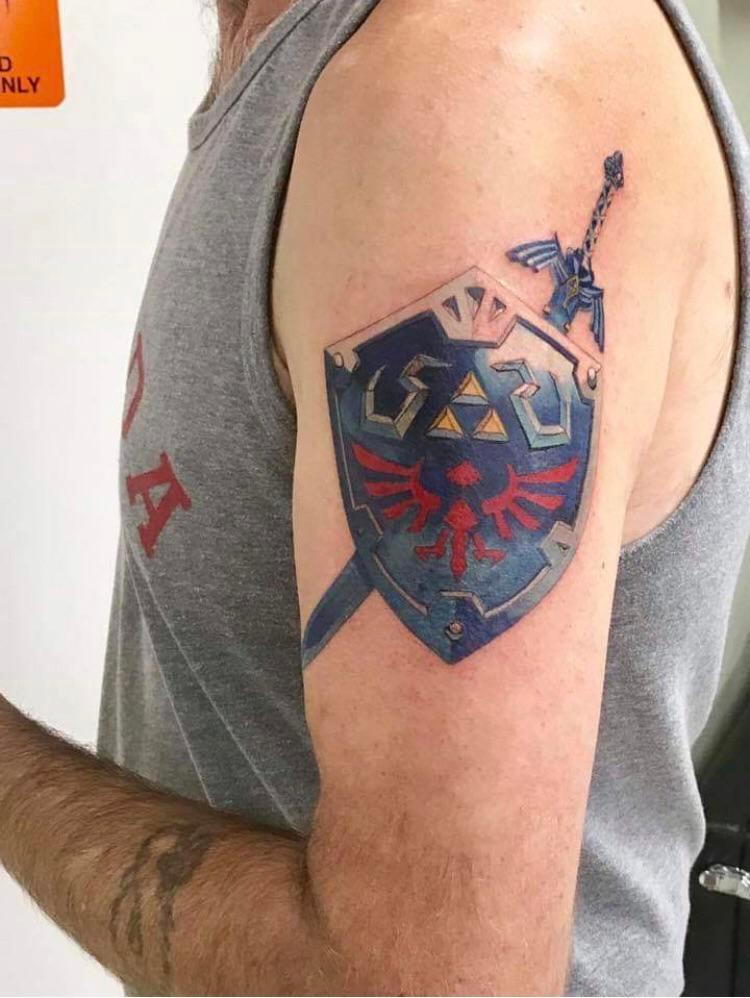 My Hylian Shield/Master Sword tattoo | Scrolller My Hylian Shield/Master Sword tattoo | Scrolller