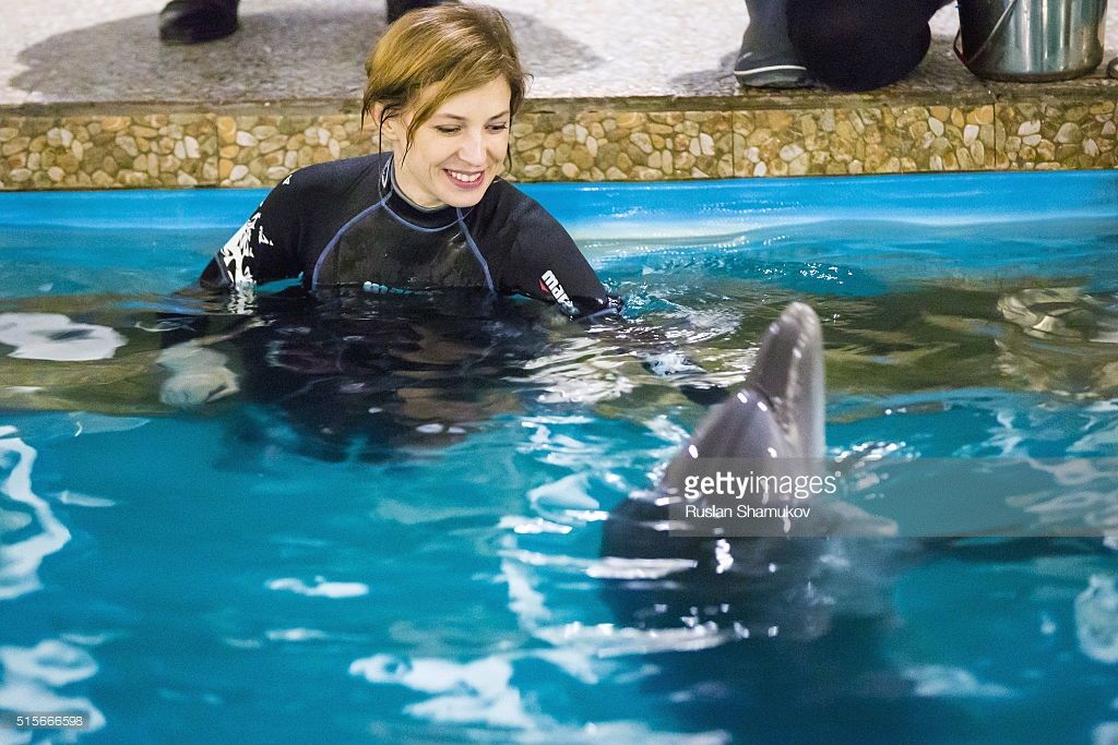 Natalia and dolphin | Scrolller