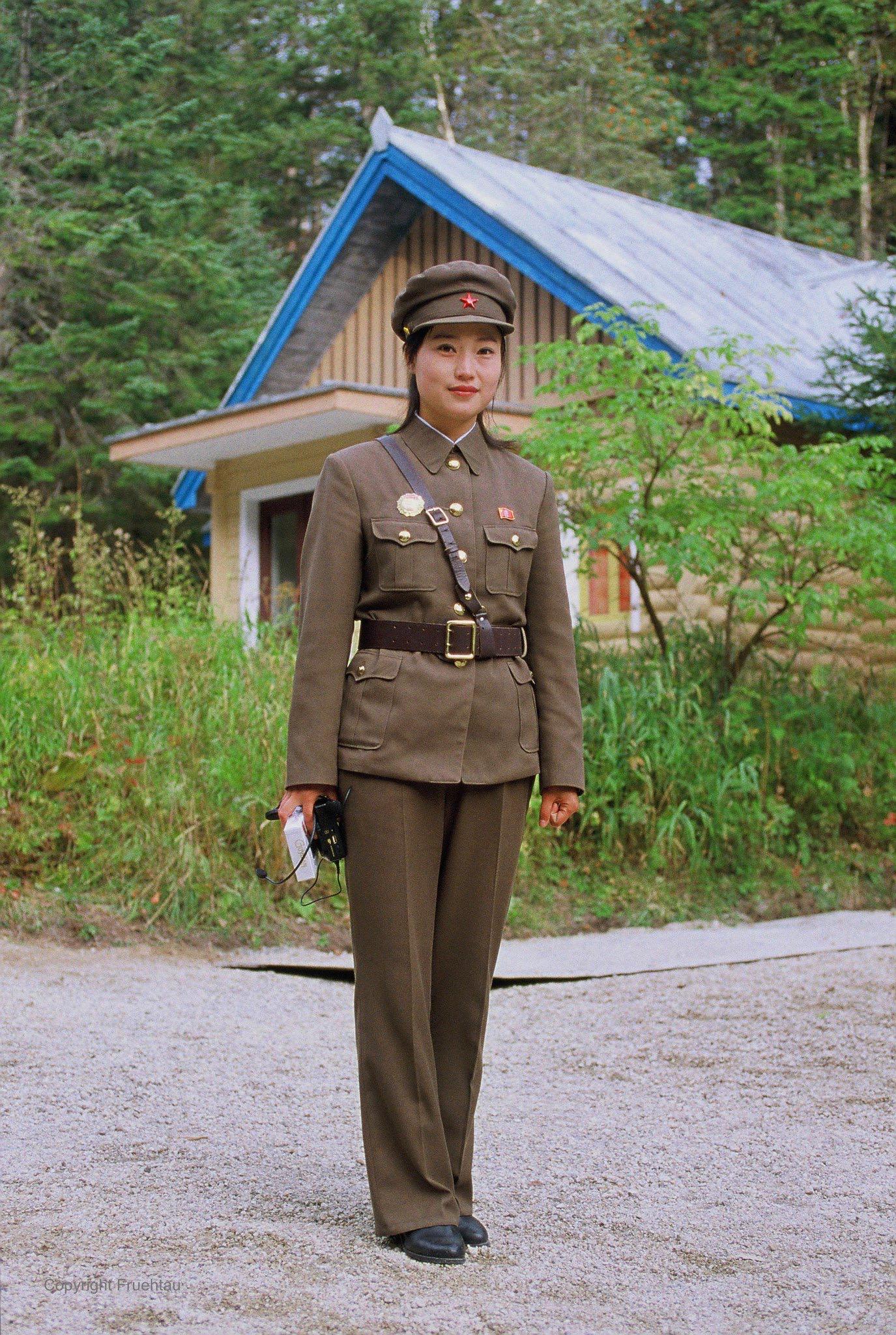 North Korean tour guide posing | Scrolller