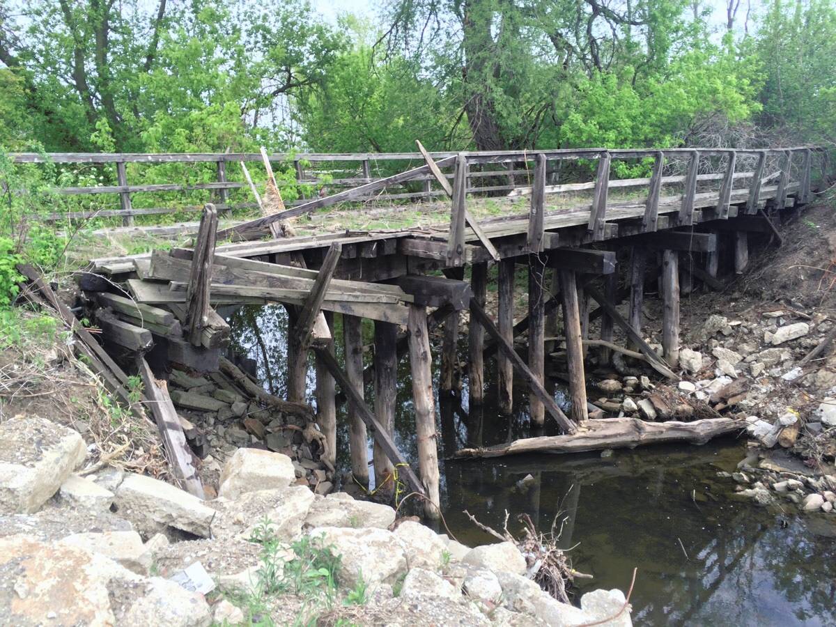 Old railroad bridge by the lake | Scrolller