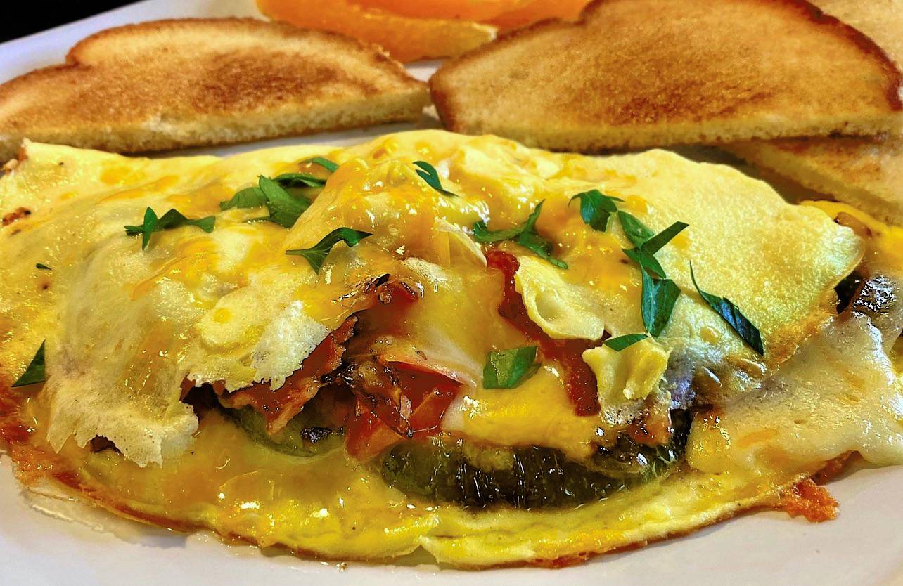 Omelet with Monterey & Cheddar Cheese melt | Scrolller