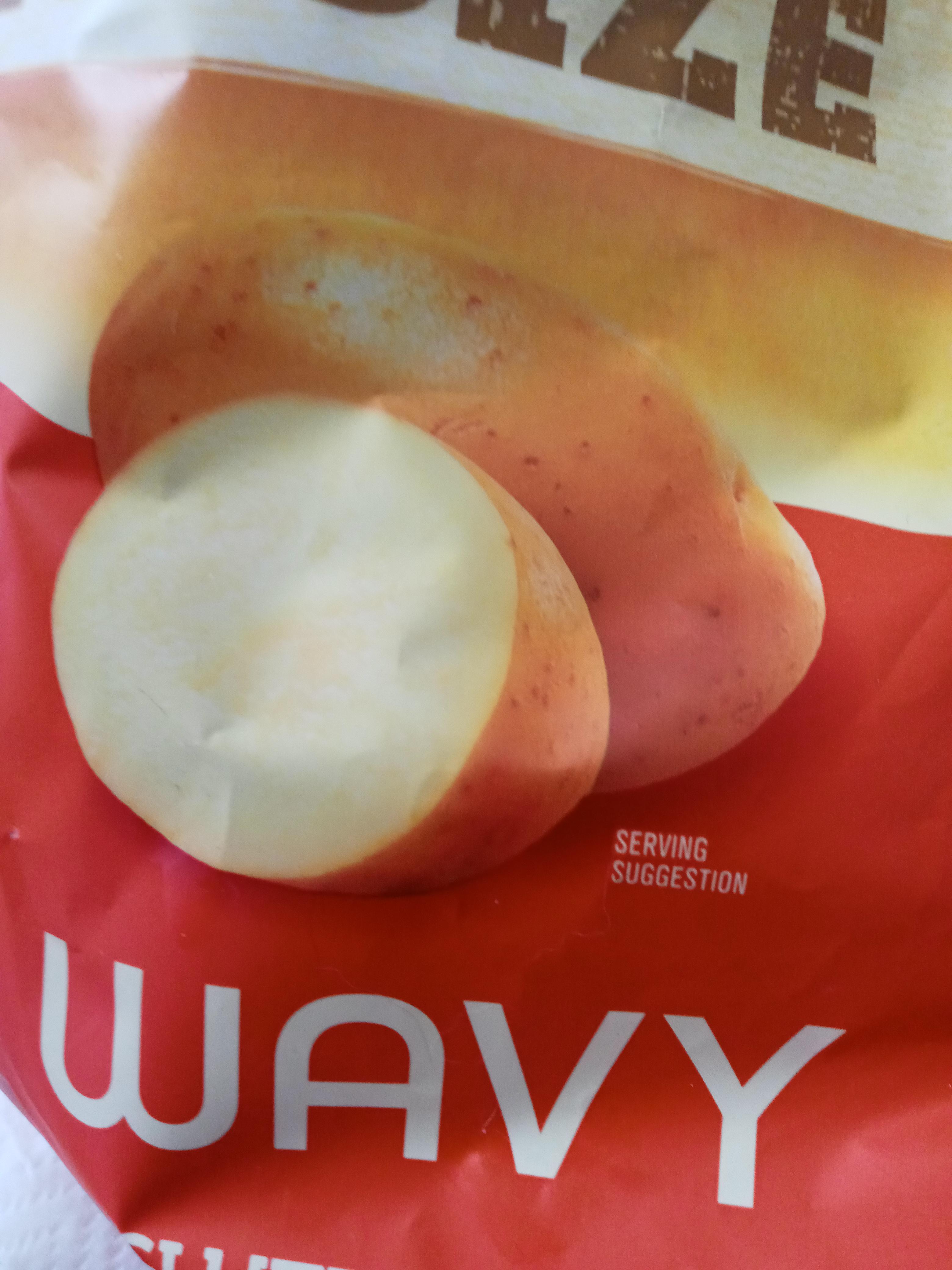 On this bag of wavy potato chips the serving suggestion is whole potato | Scrolller