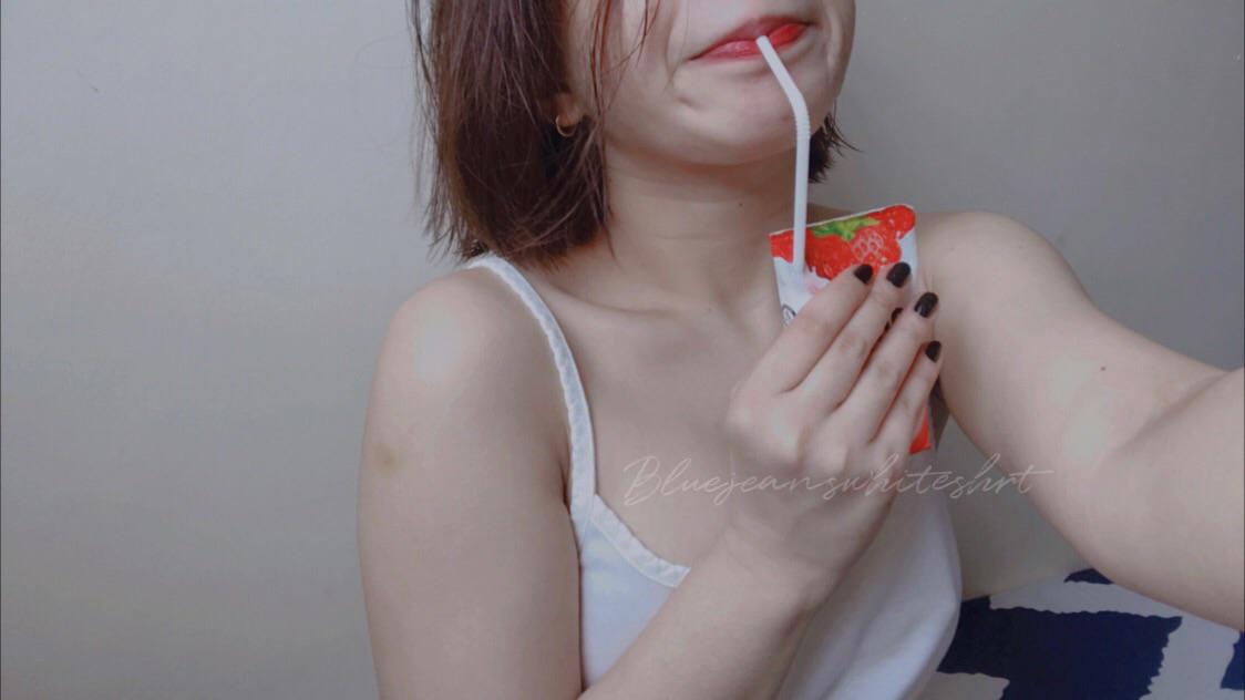 Rare photo of my awkward smile while sipping strawberry milk | Scrolller