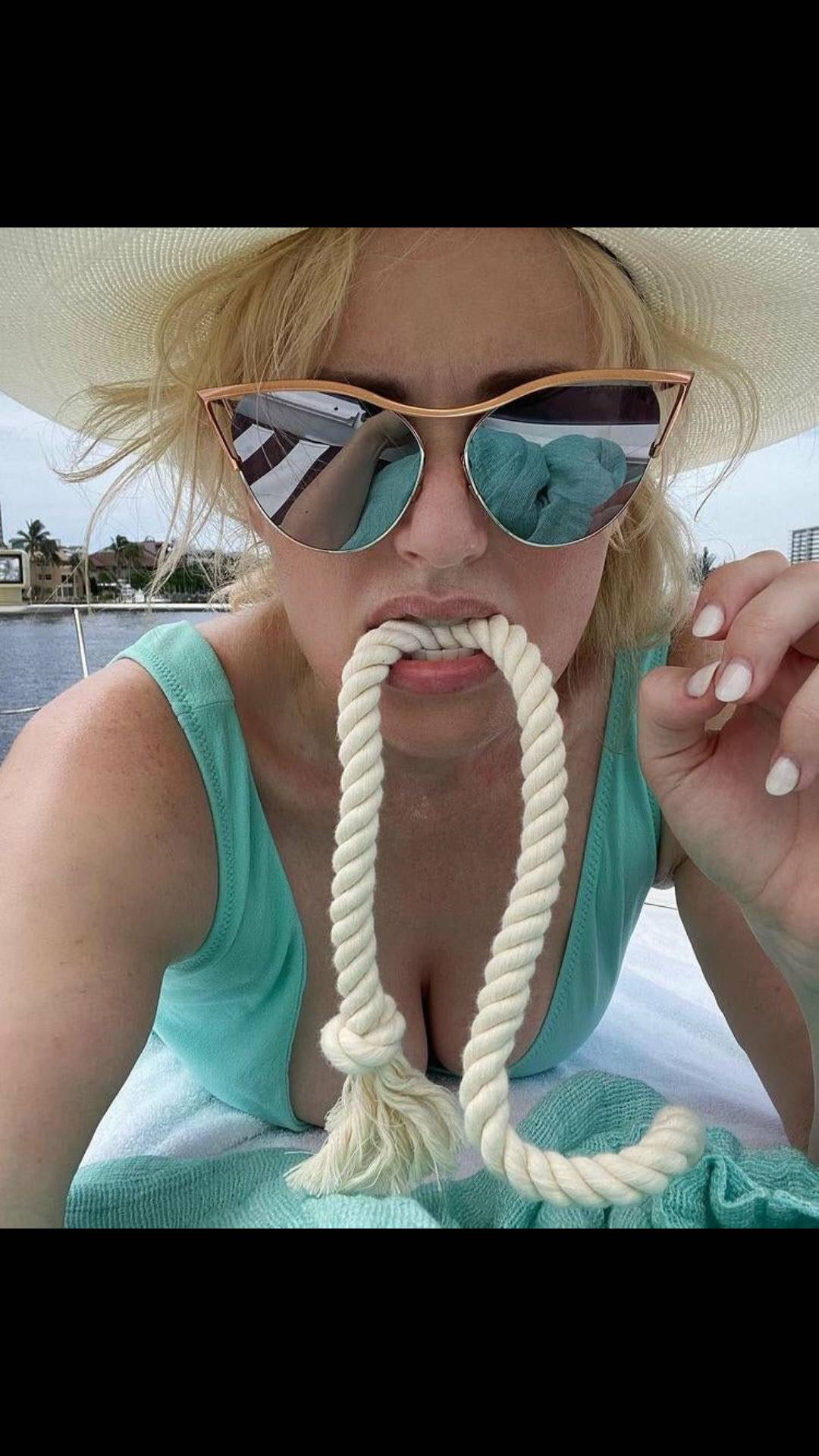 Rebel Wilson is biting down on the rope so when she gets fucked in her ass she doesn't scream ...
