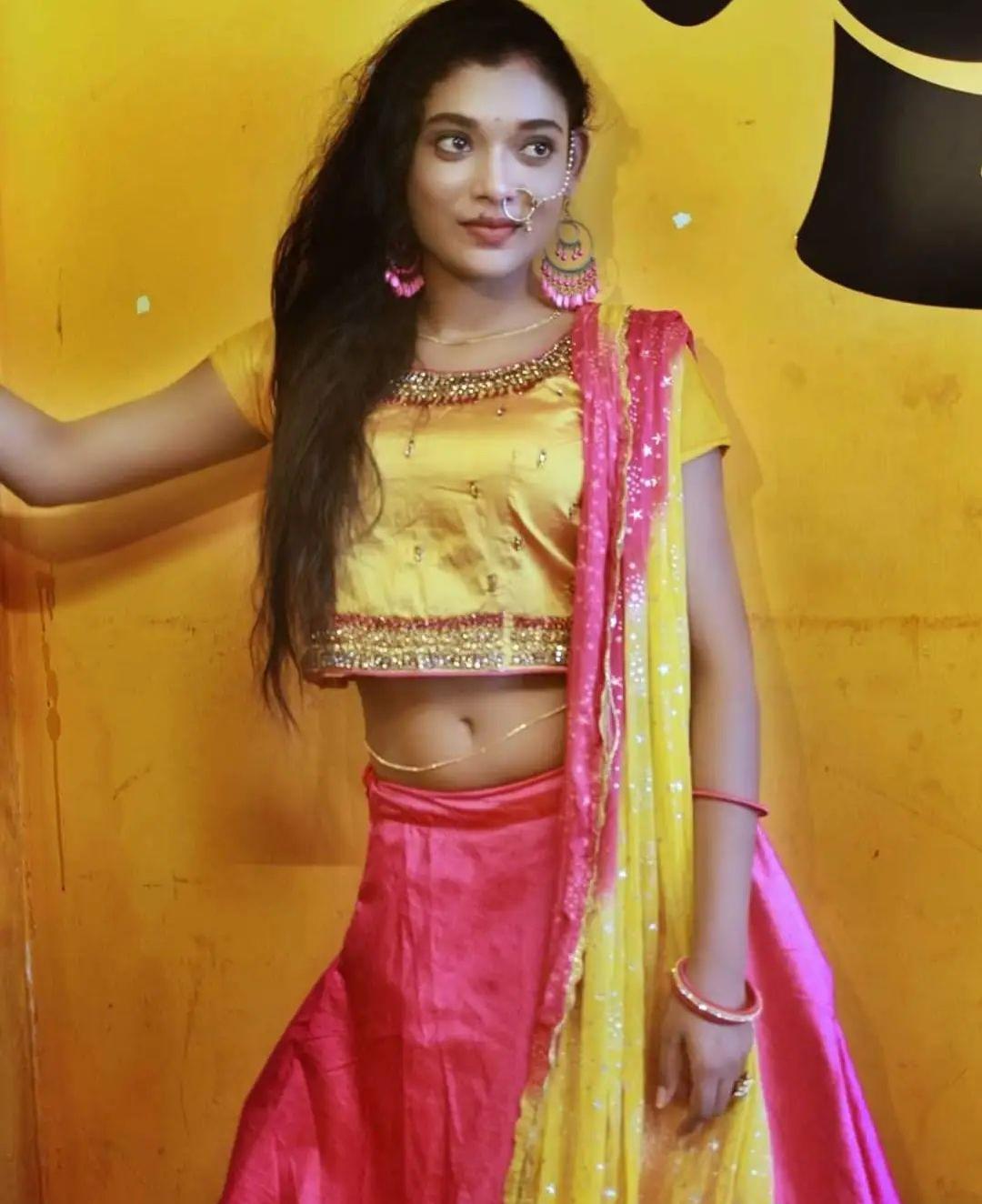 Rekha Boj navel in pink lehenga and yellow choli | Scrolller
