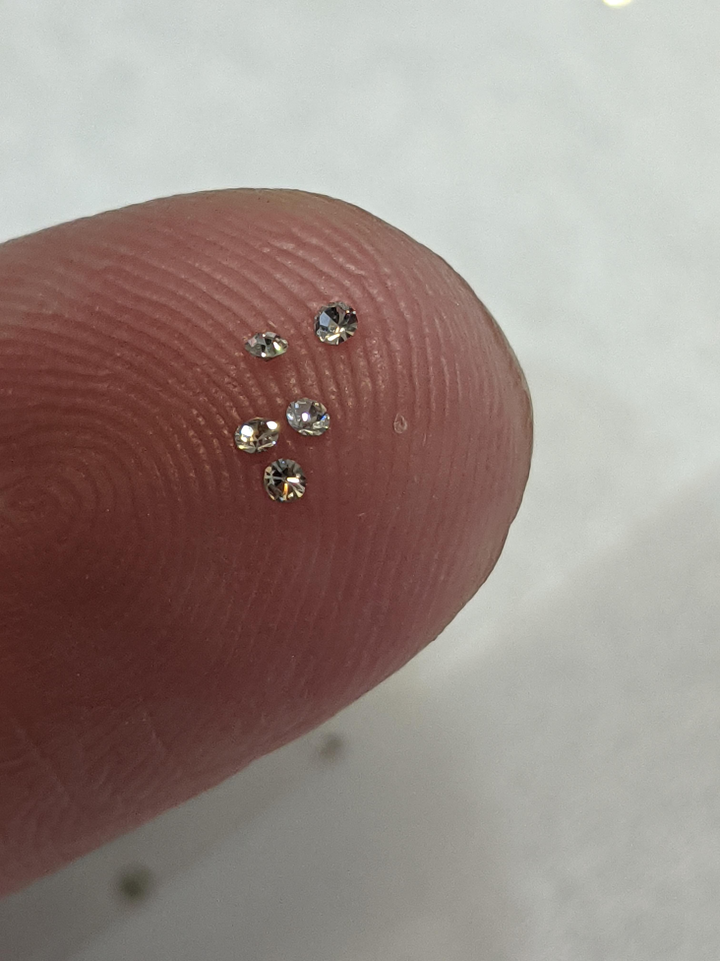 Replacing missing diamonds on eyeglass frames with super glue and tweezers | Scrolller