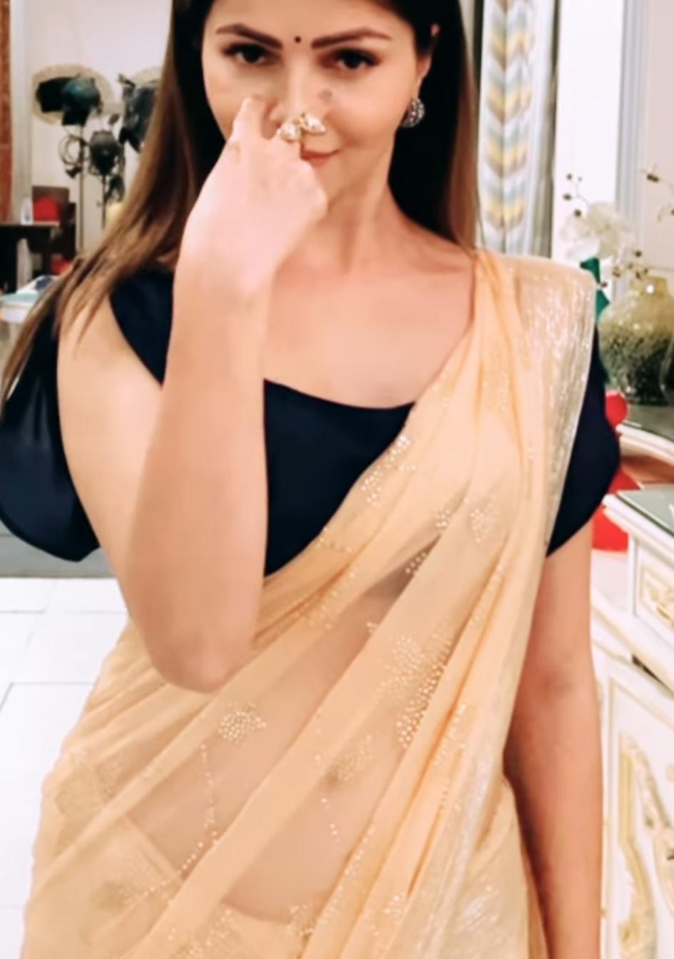 Rubina Dilaik navel in cream transparent saree and black blouse | Scrolller