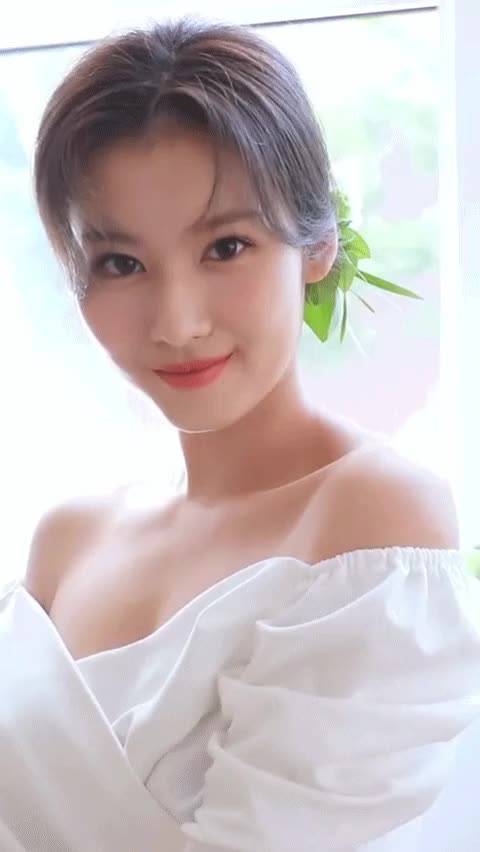 Sana - close up, white top | Scrolller