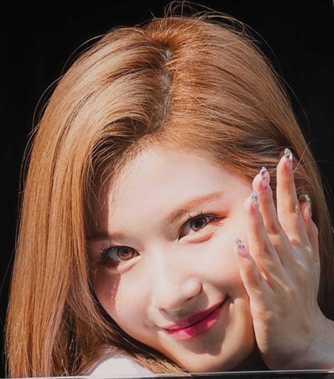 Sana - red hair, close up, car window | Scrolller