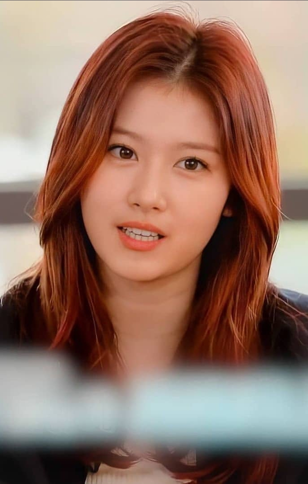 Sana - red hair, close up | Scrolller