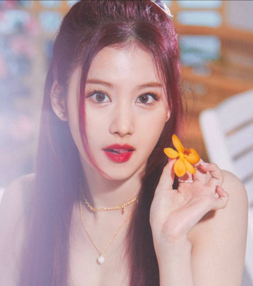 Sana - red hair, close up | Scrolller