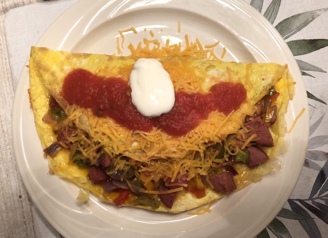 Sausage, vegetable, and cheese omelette | Scrolller