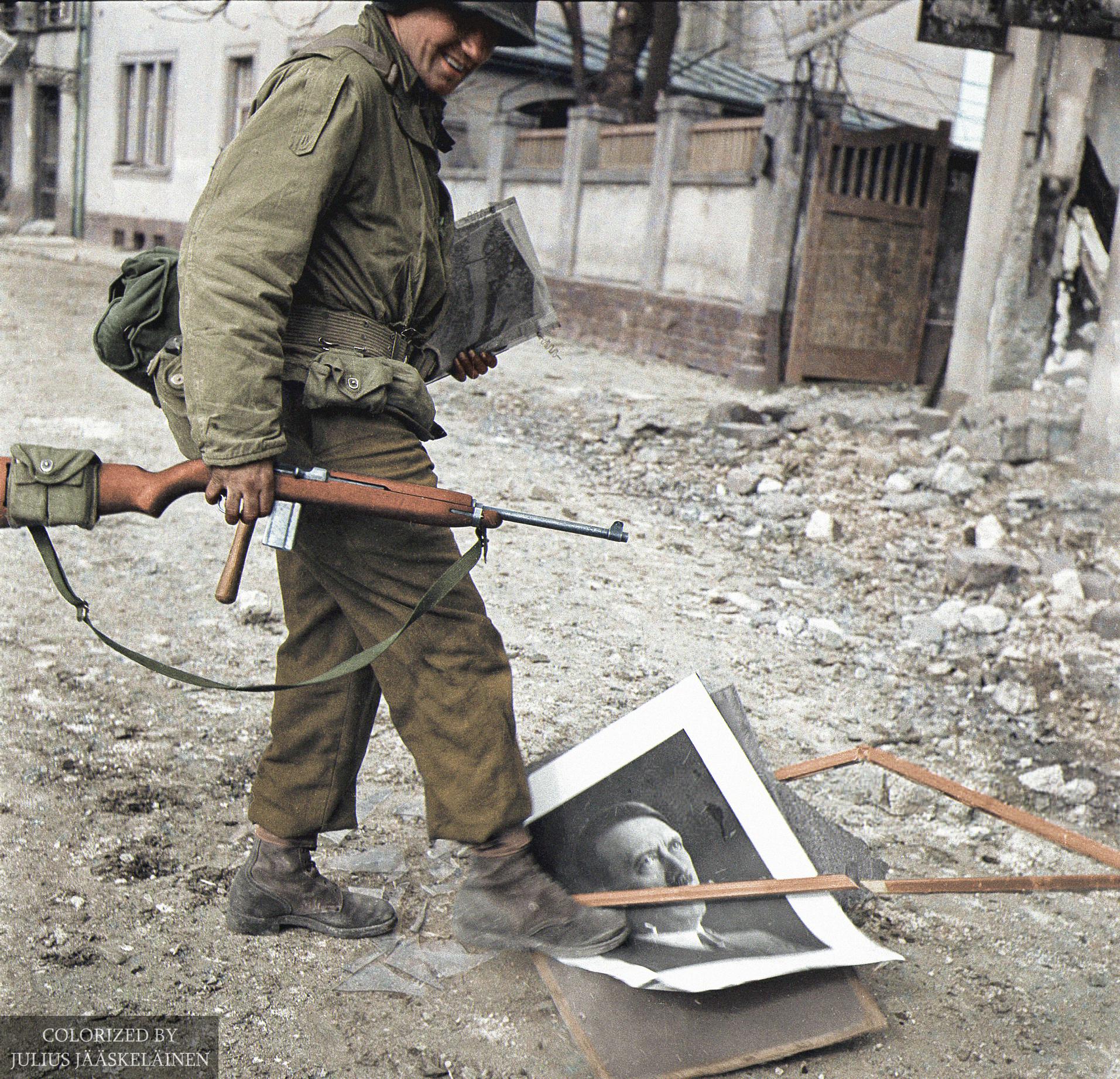'See ya later Adolf!' American soldier of the 87th infantry division in Koblenz, Germany, march ...