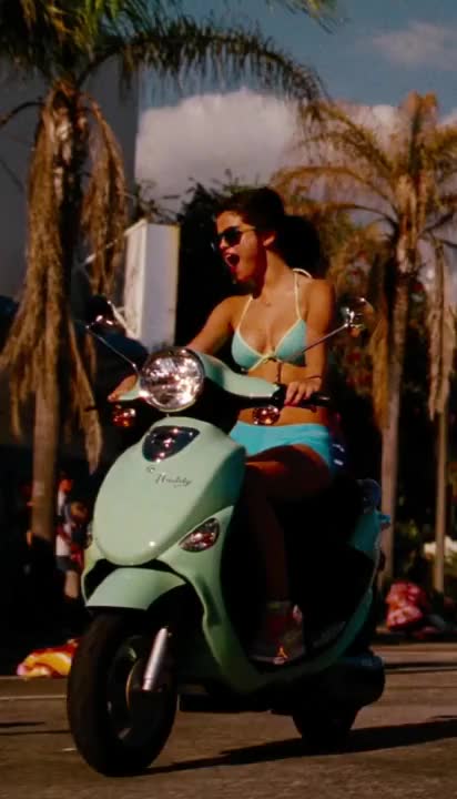 Selena Gomez riding a scooter | Scrolller