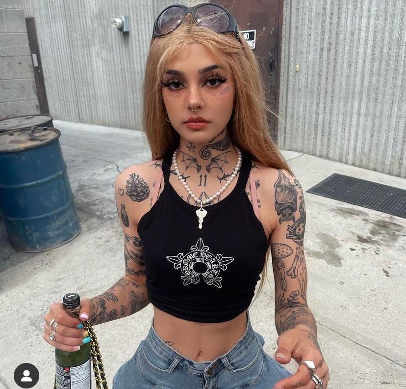 She removes all texture from the bottom half of her face but leaves the top alone so you can see ...