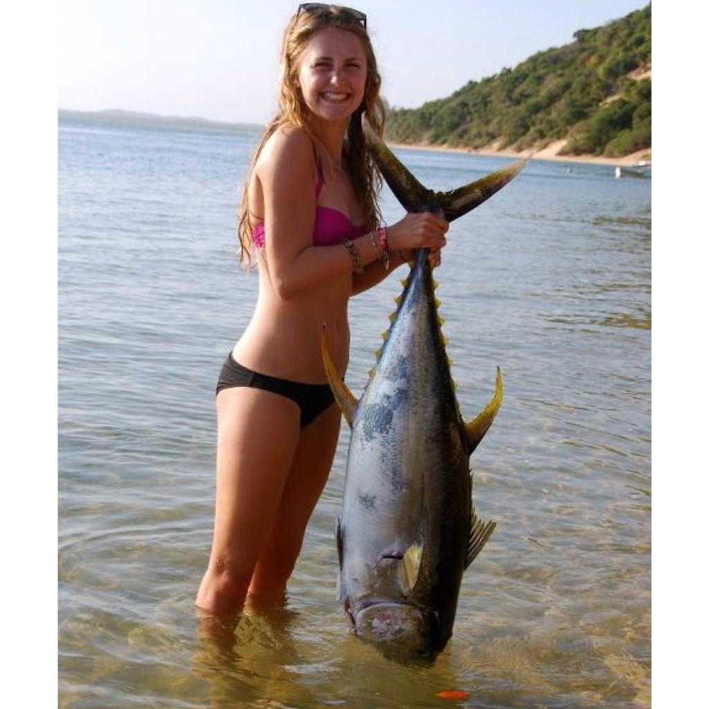 She's drowning that fish! No it's probably fine. | Scrolller