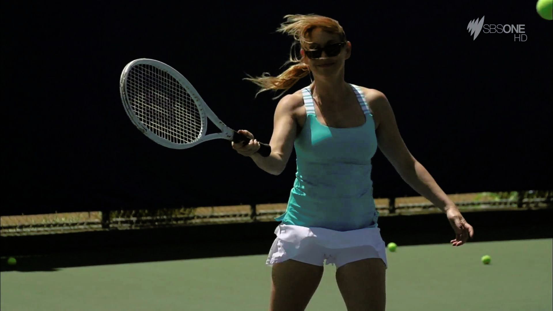 She's got GUNS playing tennis - maybe something else too. | Scrolller