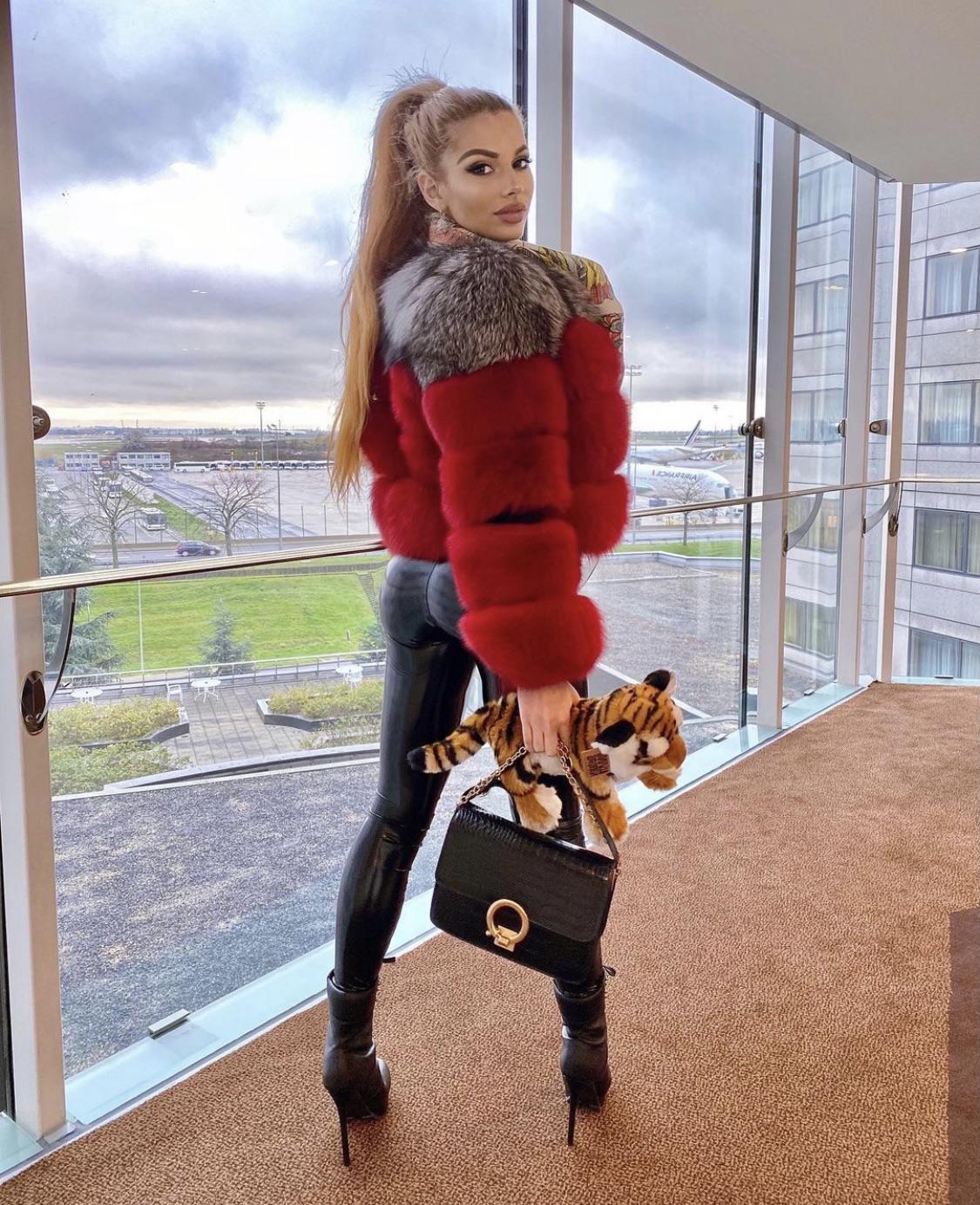 Shiny pants and a fur coat | Scrolller