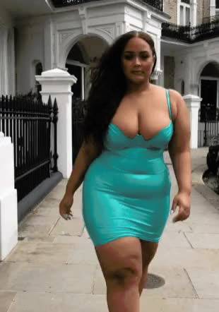 Showing off her curves in a stunning tight dress | Scrolller