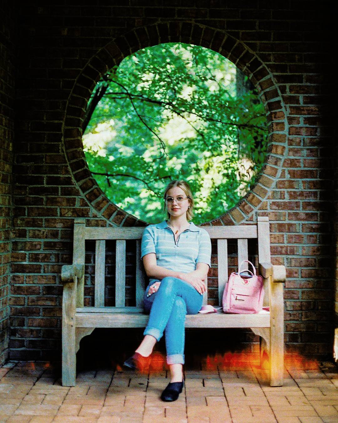 Sitting on a bench | Scrolller