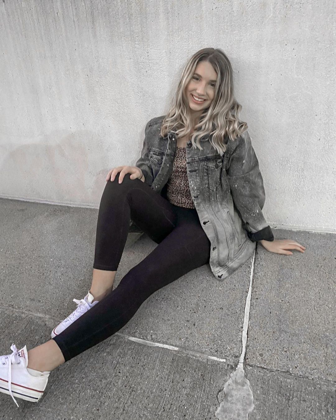 Sitting on a Sidewalk | Scrolller