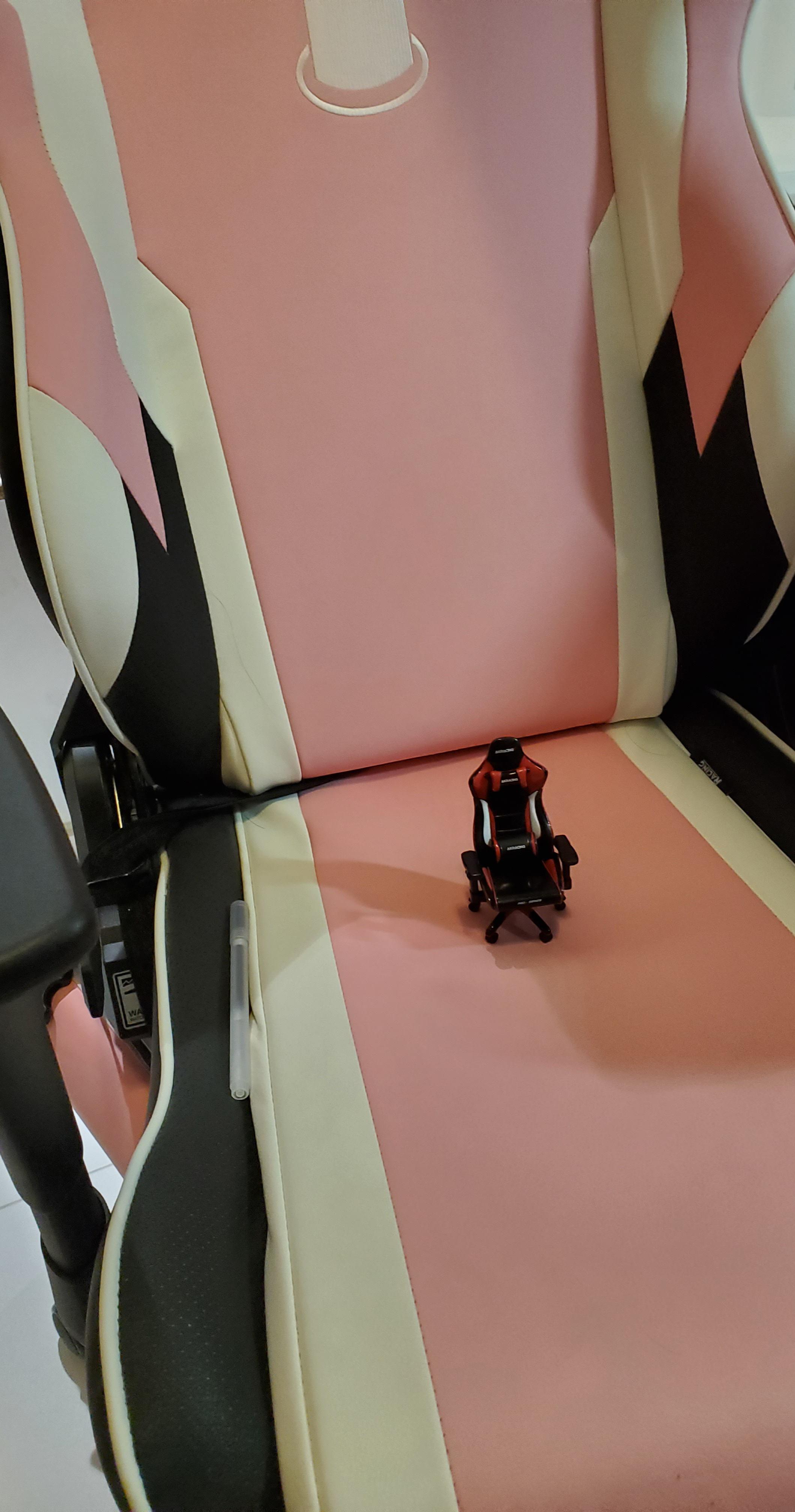 Small gaming chair on big gaming chair. | Scrolller