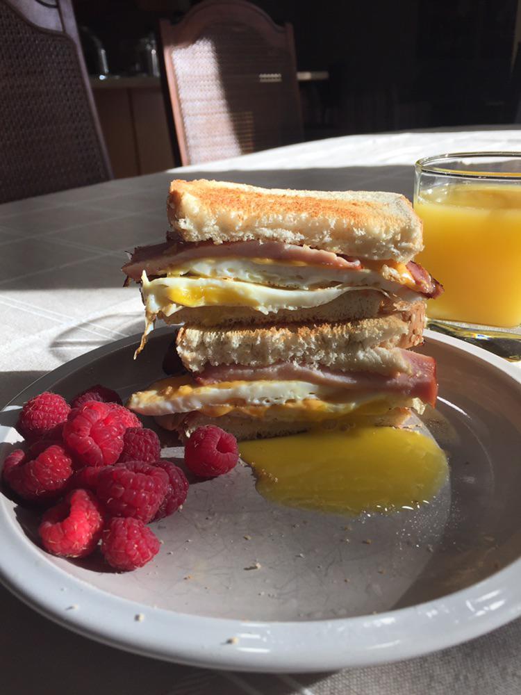 Smoked pork chop on egg and cheese sandwich. | Scrolller