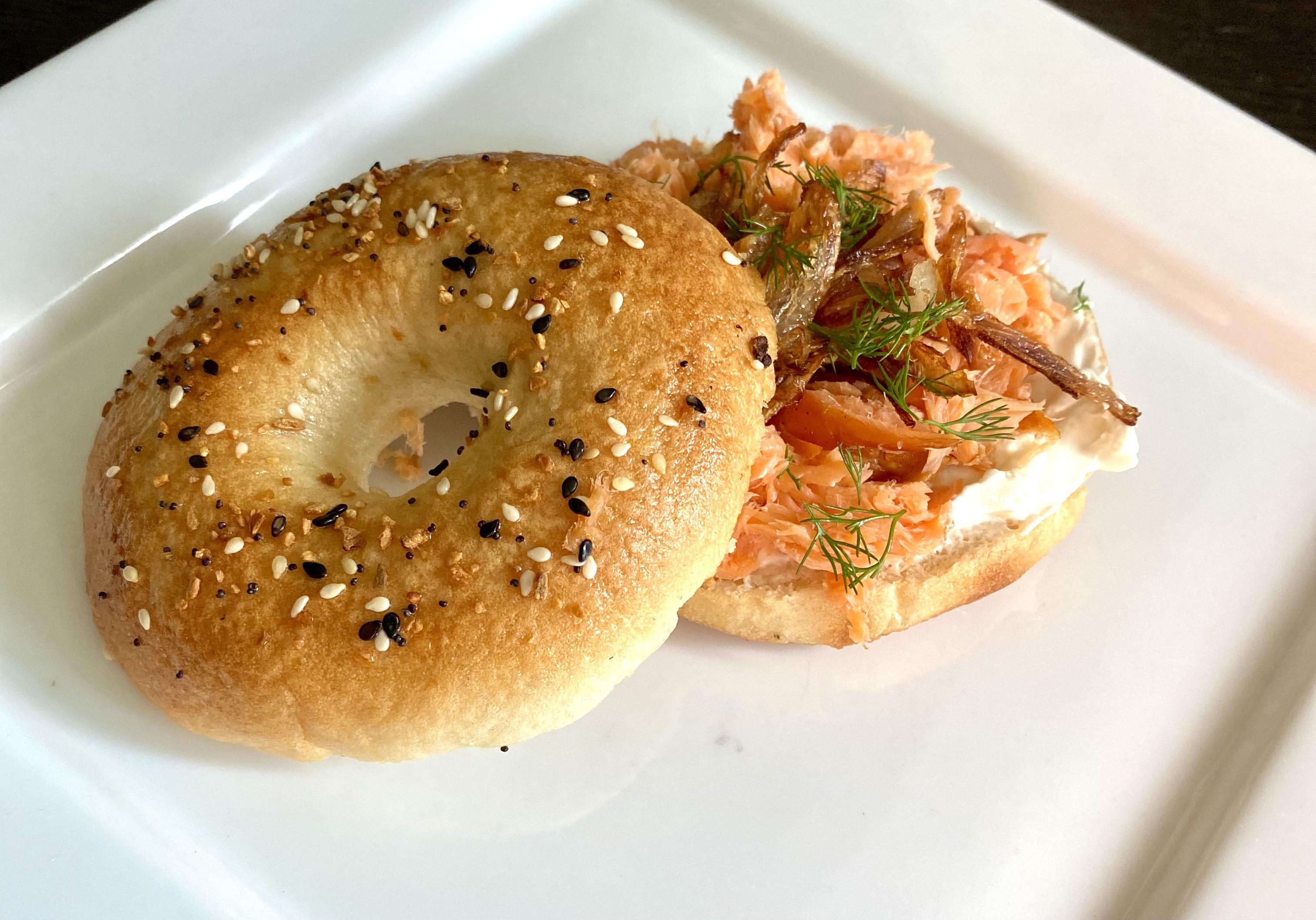 Smoked some salmon, made some homemade bagels, laid it on that schmeeear, and topped it with ...