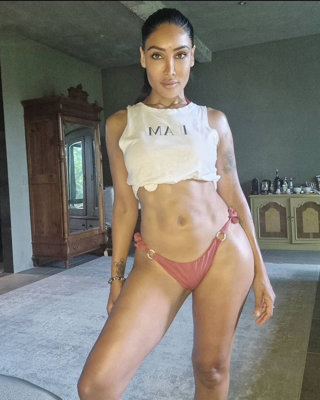 Sofia Hayat navel in white sleeveless shirt and pink thong | Scrolller