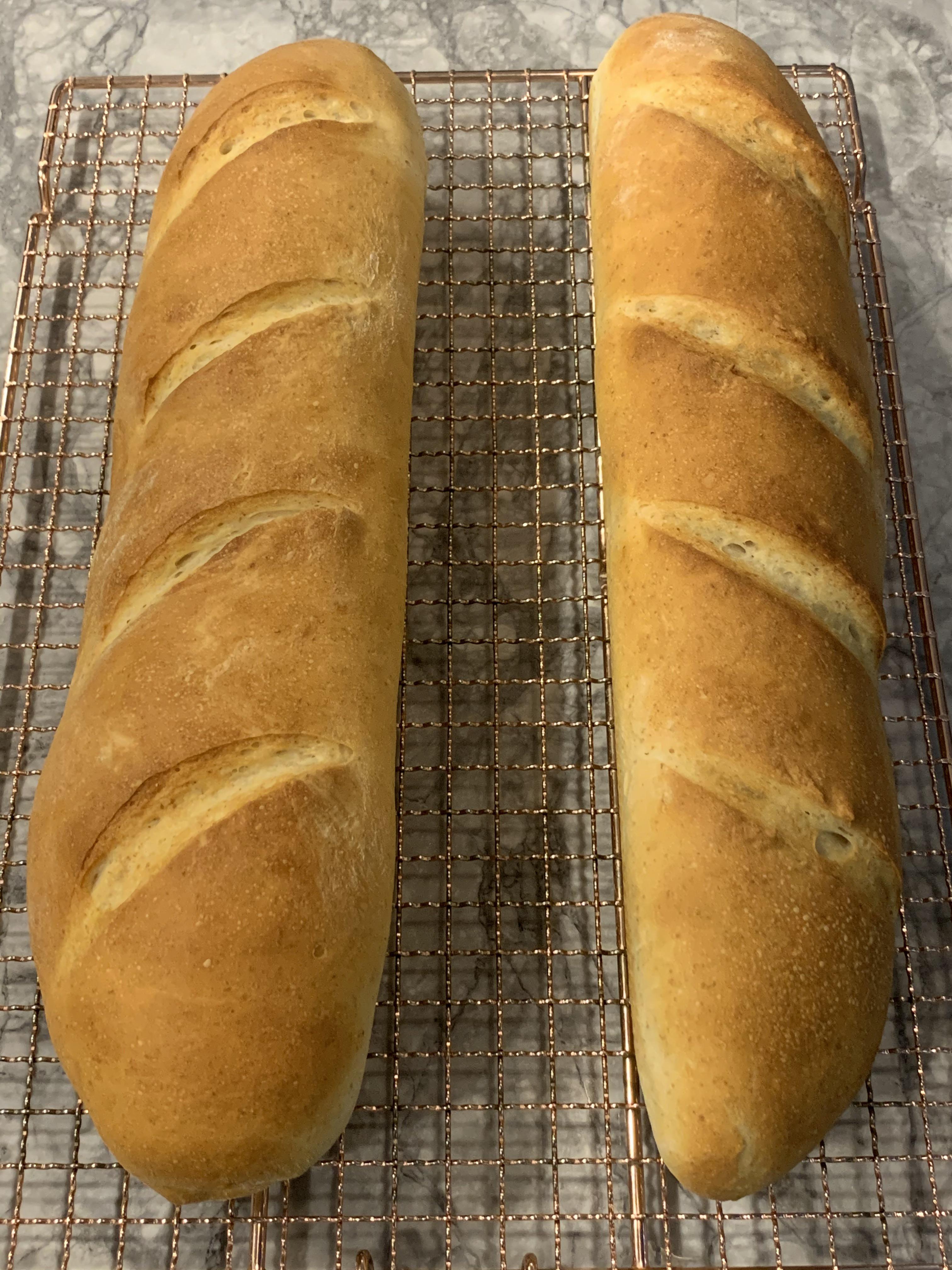 Sourdough French bread hot out of the oven. | Scrolller
