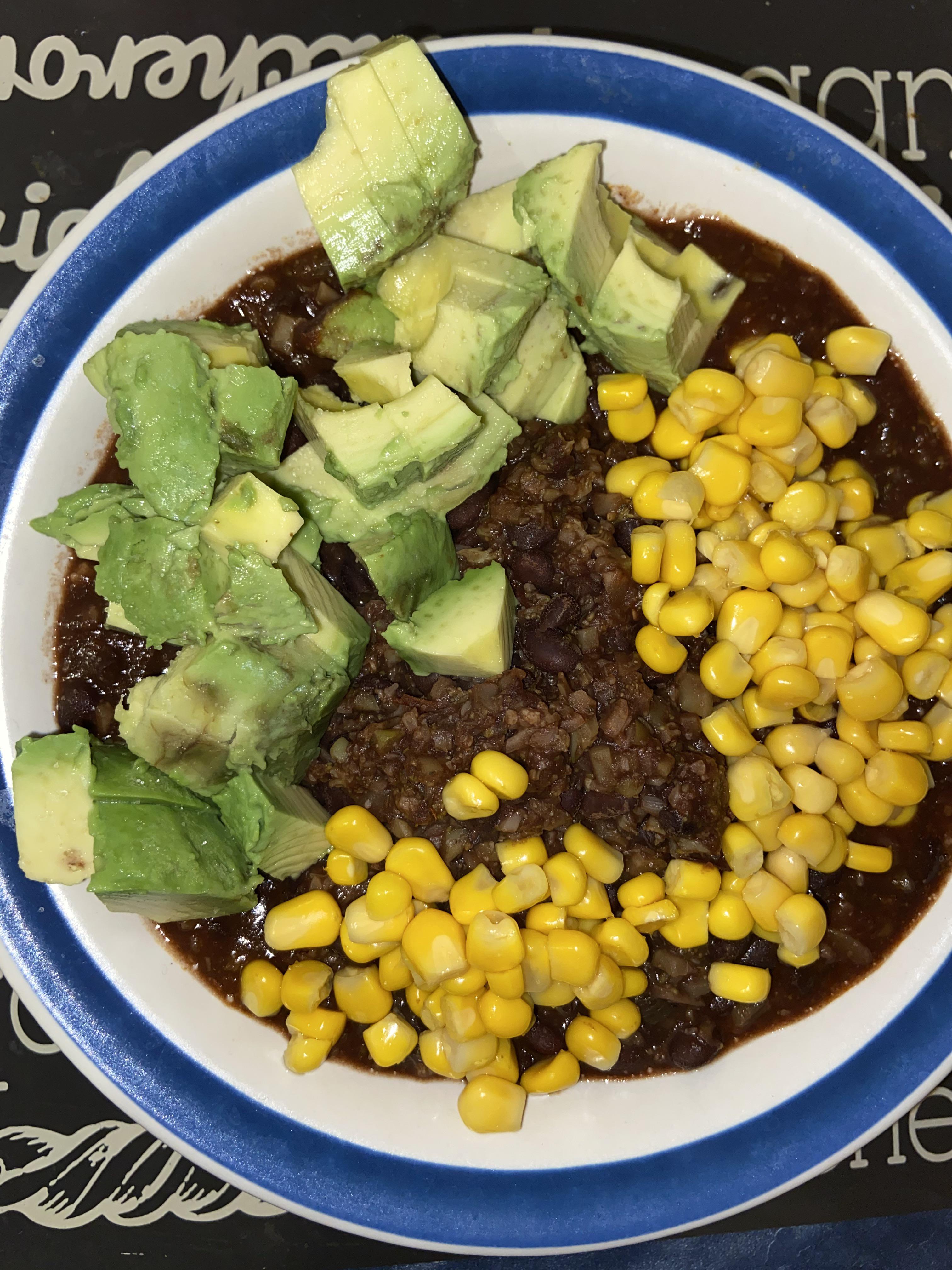 Spicy black beans, aguacate, corn and cauliflower rice | Scrolller
