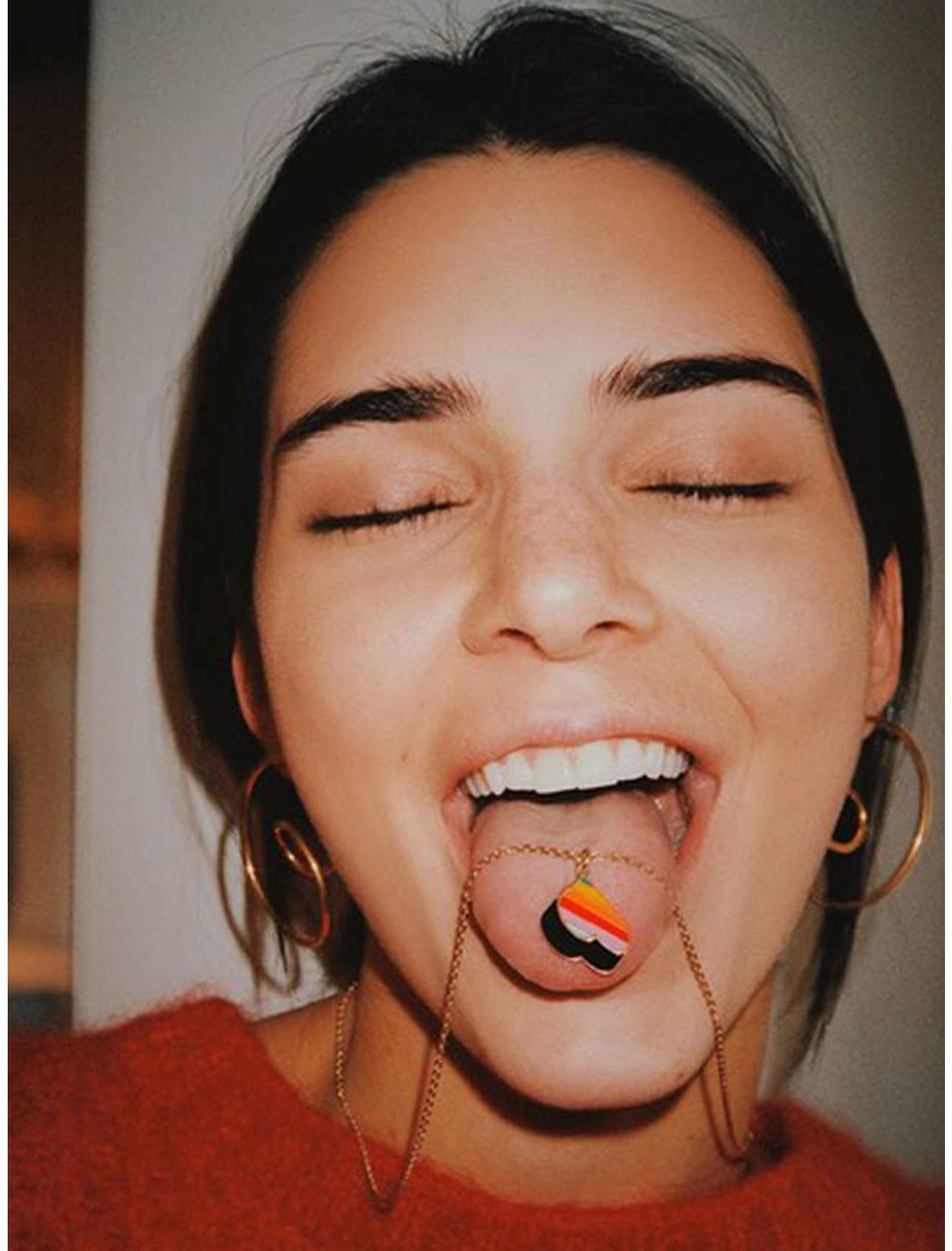 Sticking her tongue out | Scrolller