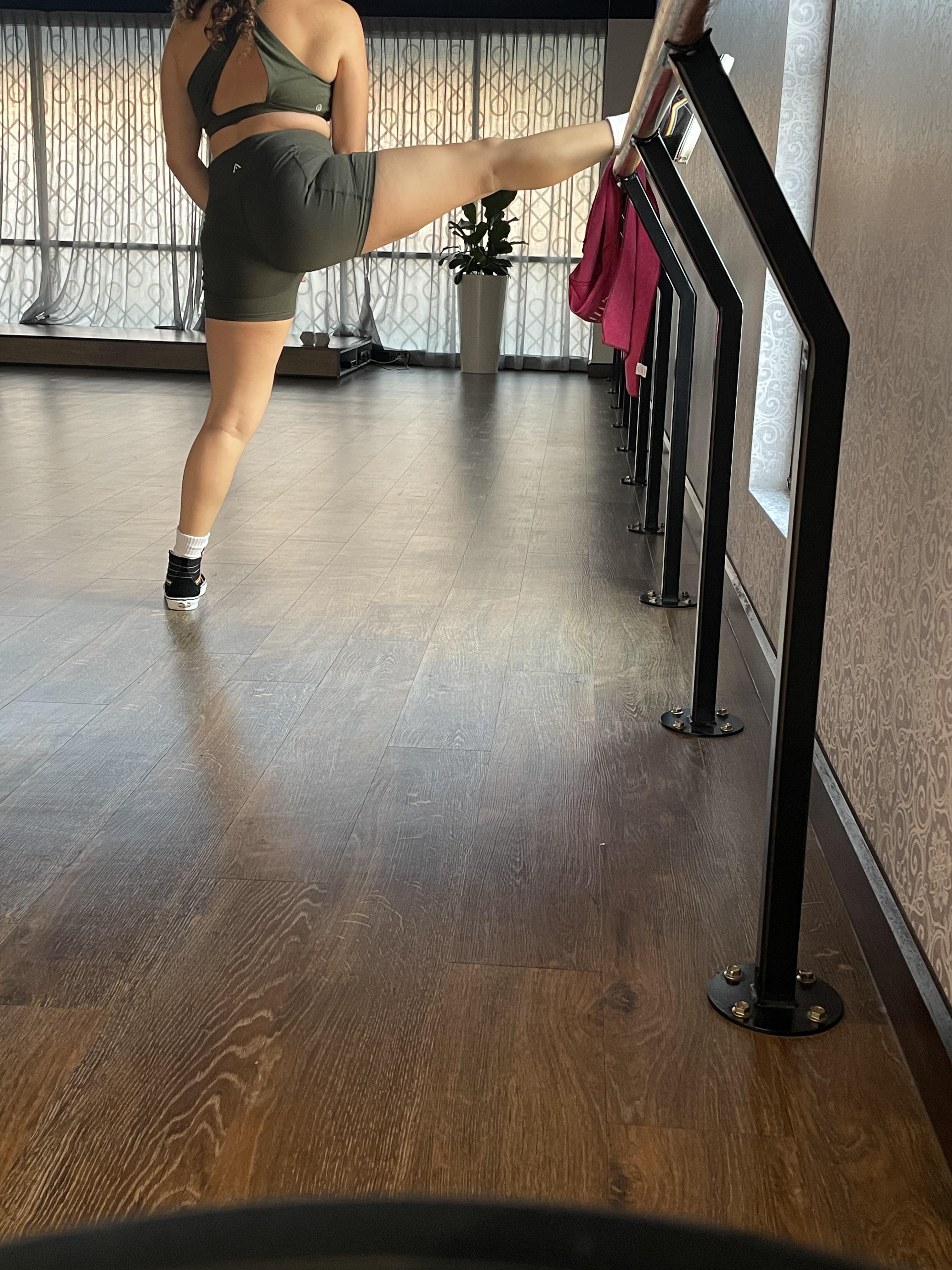 Stretching out in the yoga studio | Scrolller