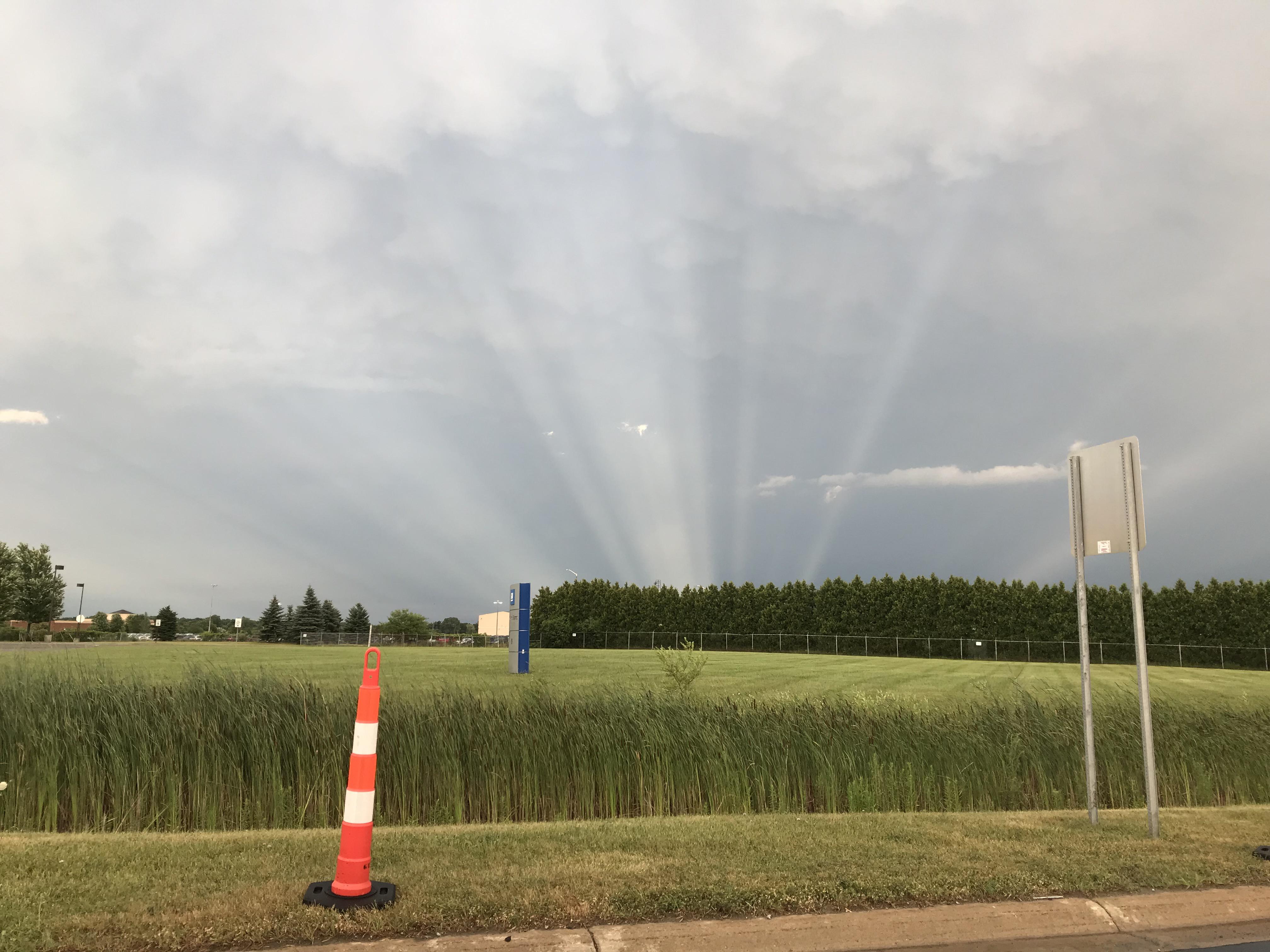 Sunlight passing through the side of a severe thunderstorm that passed through Fenton Michigan ...