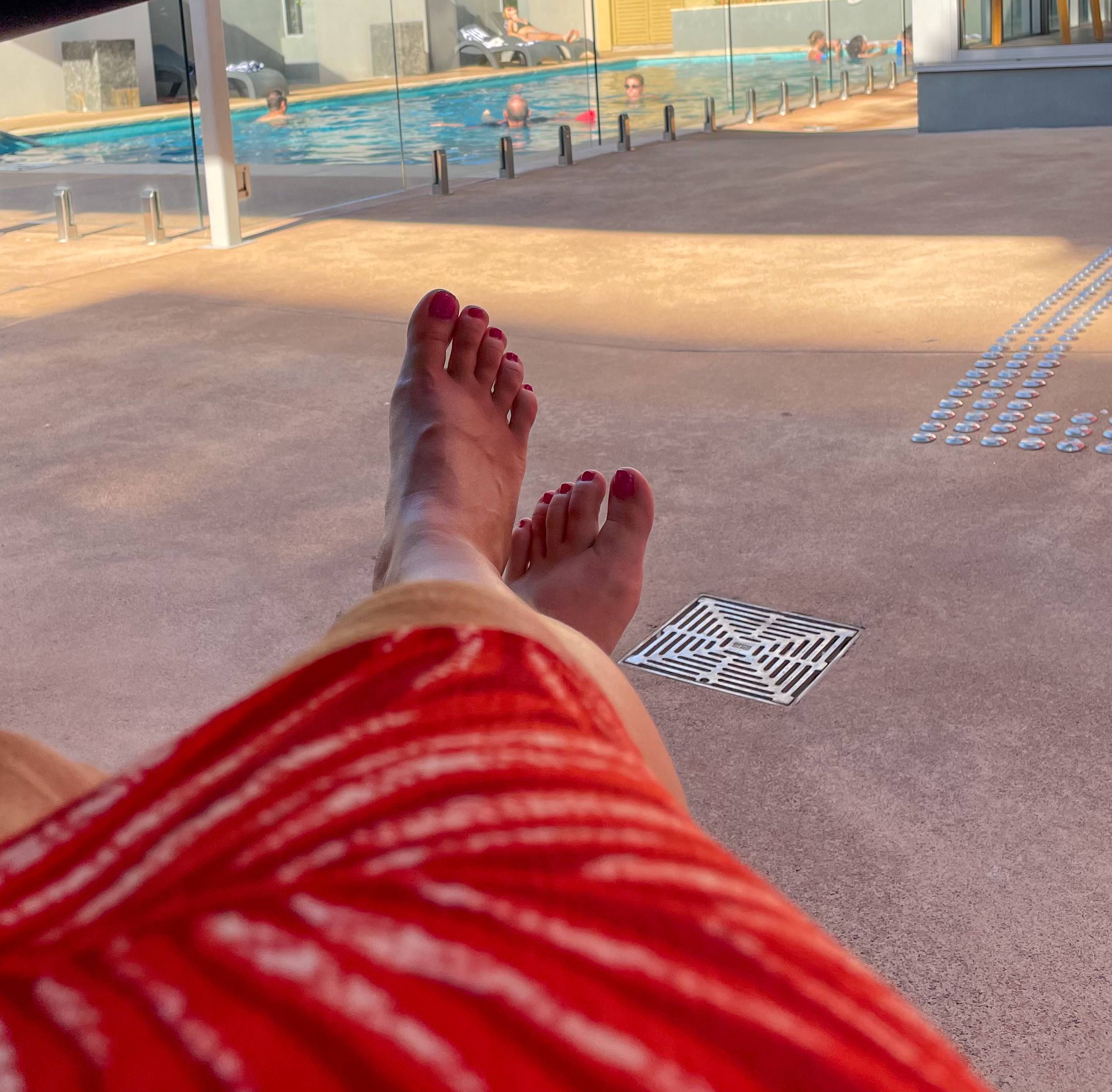 Sunning my feet poolside | Scrolller
