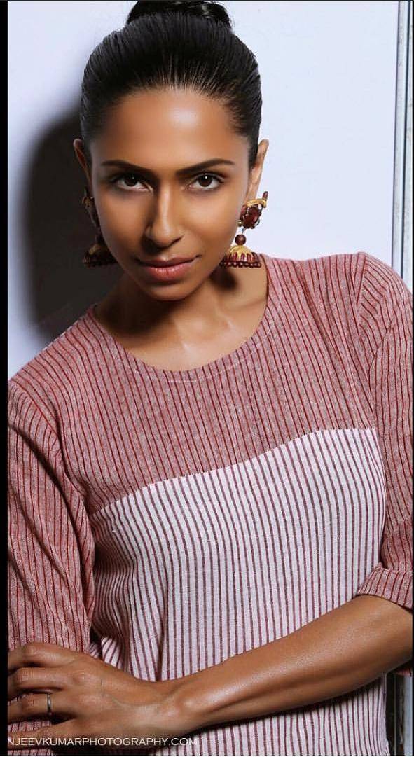 Super indian model ninaj pinto with slicked hairbun | Scrolller