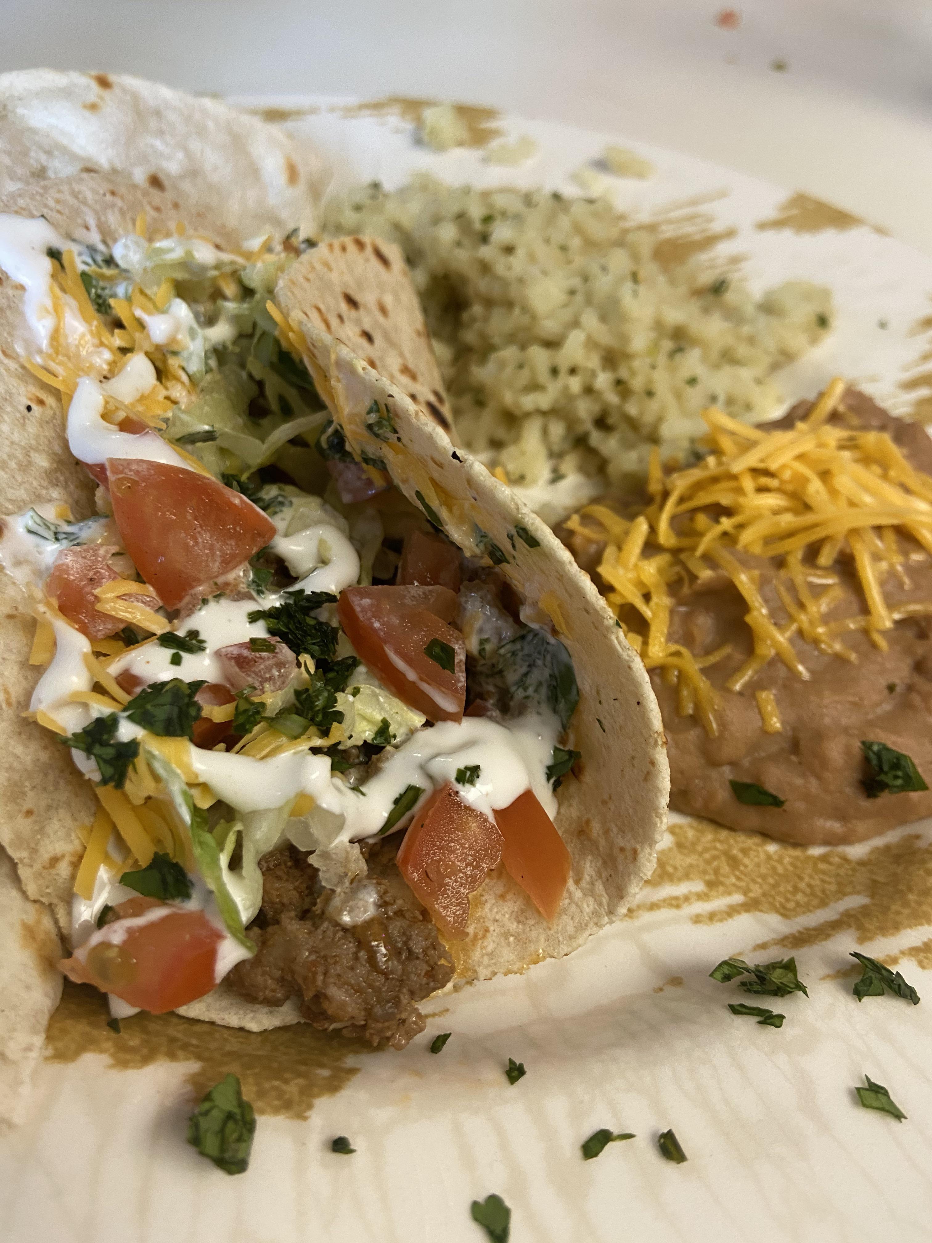 Taco Easter!!! Ground beef tacos with cilantro lime rice and refried beans. This may become a ...