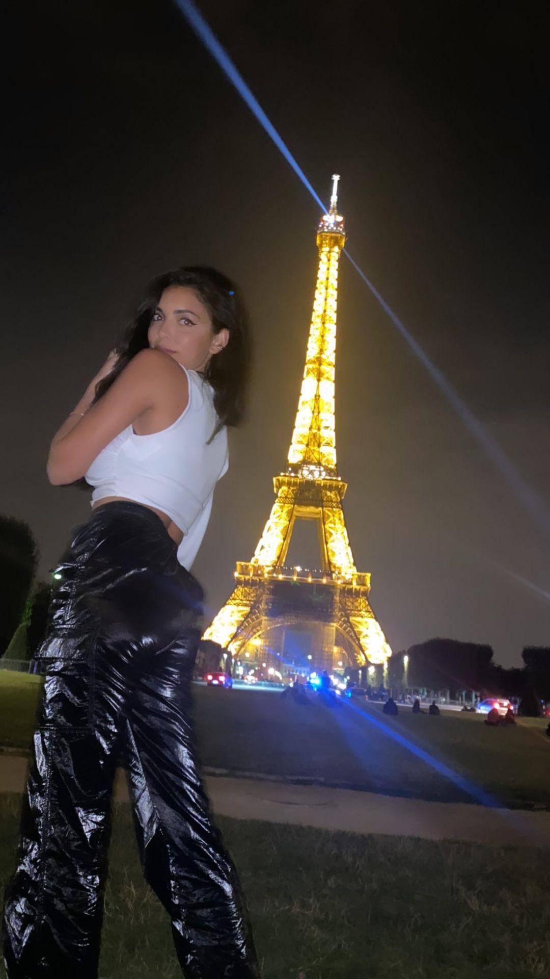 Tara with the Eiffel Tower | Scrolller