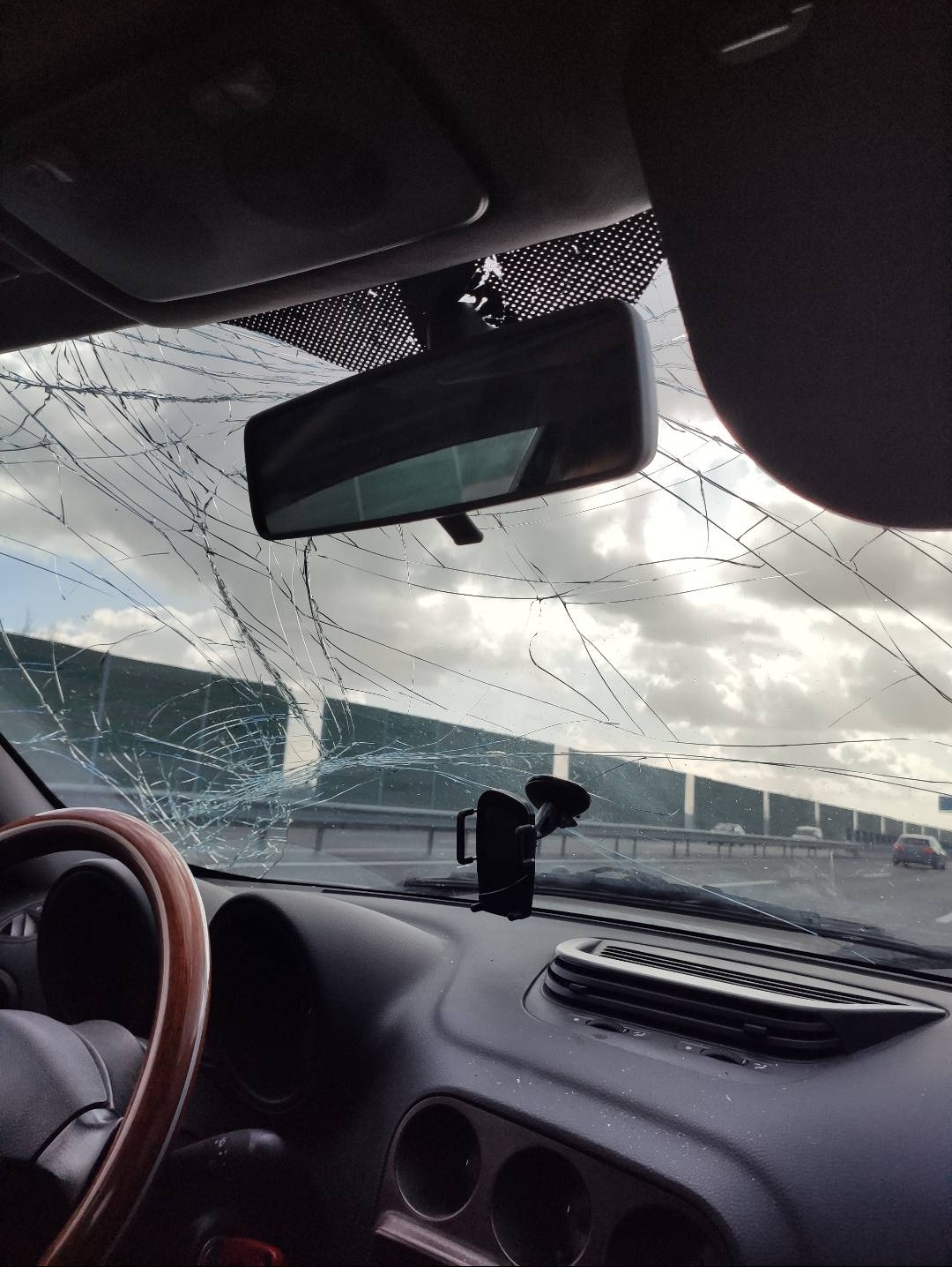 The hood hit the glass while driving | Scrolller