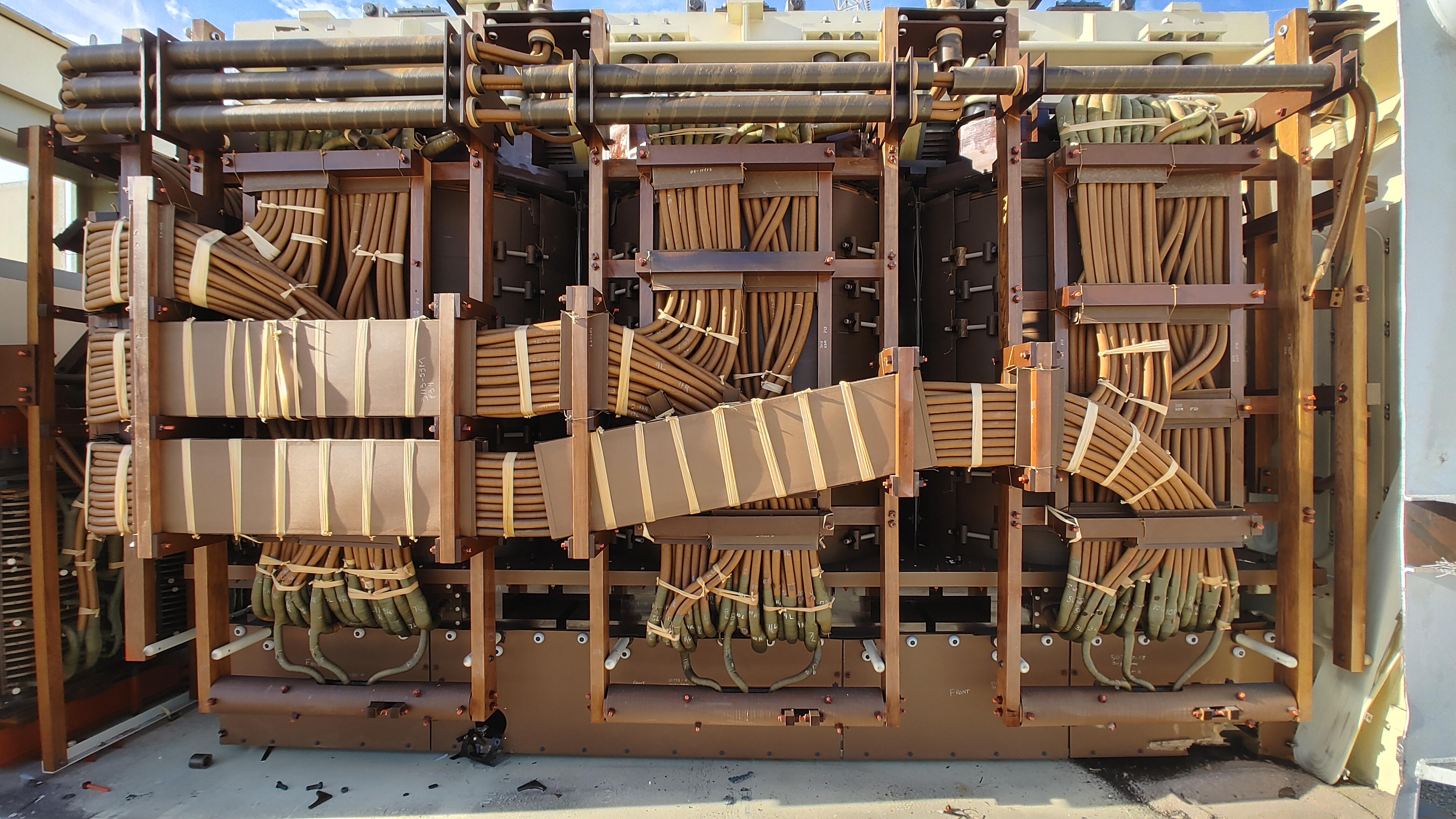 The inside of a 600,000 pound transformer. | Scrolller